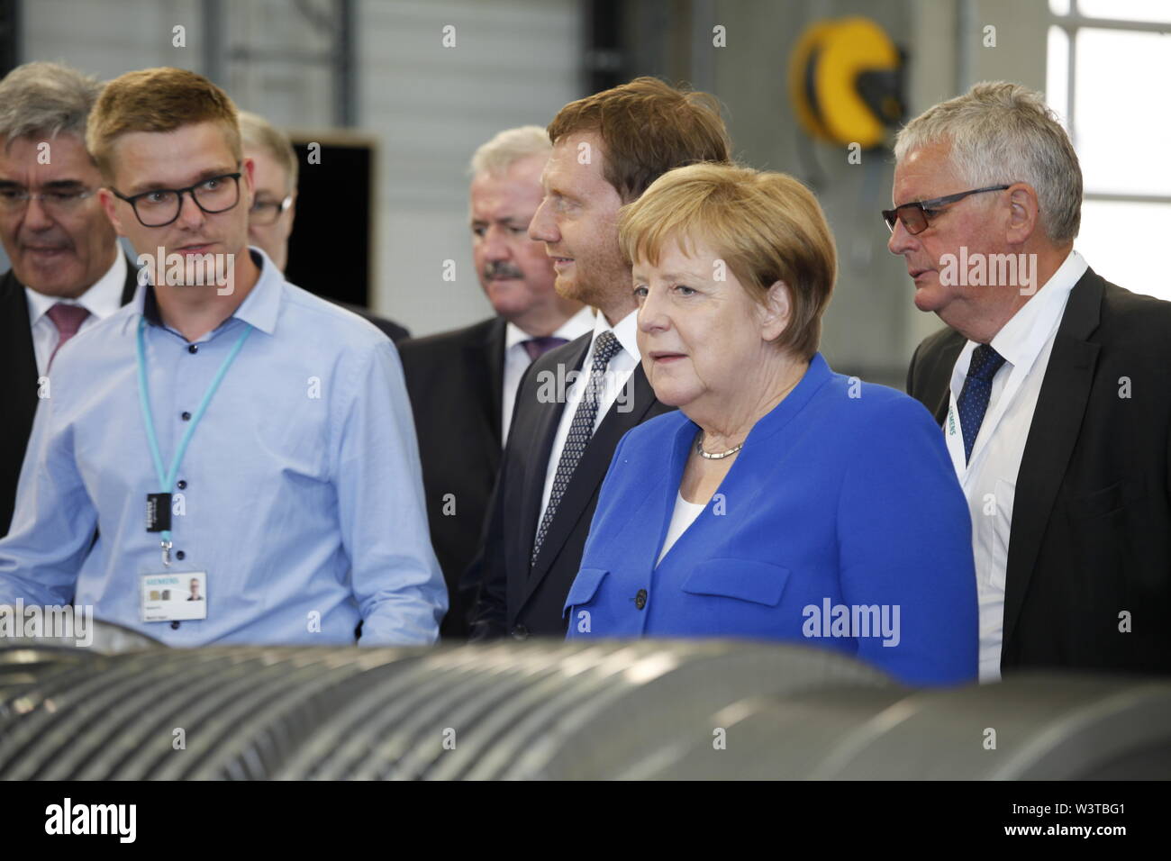 Michael Kretschmer, Bundeskanzlerin Angela Merkel und Ronald Schmidt ...