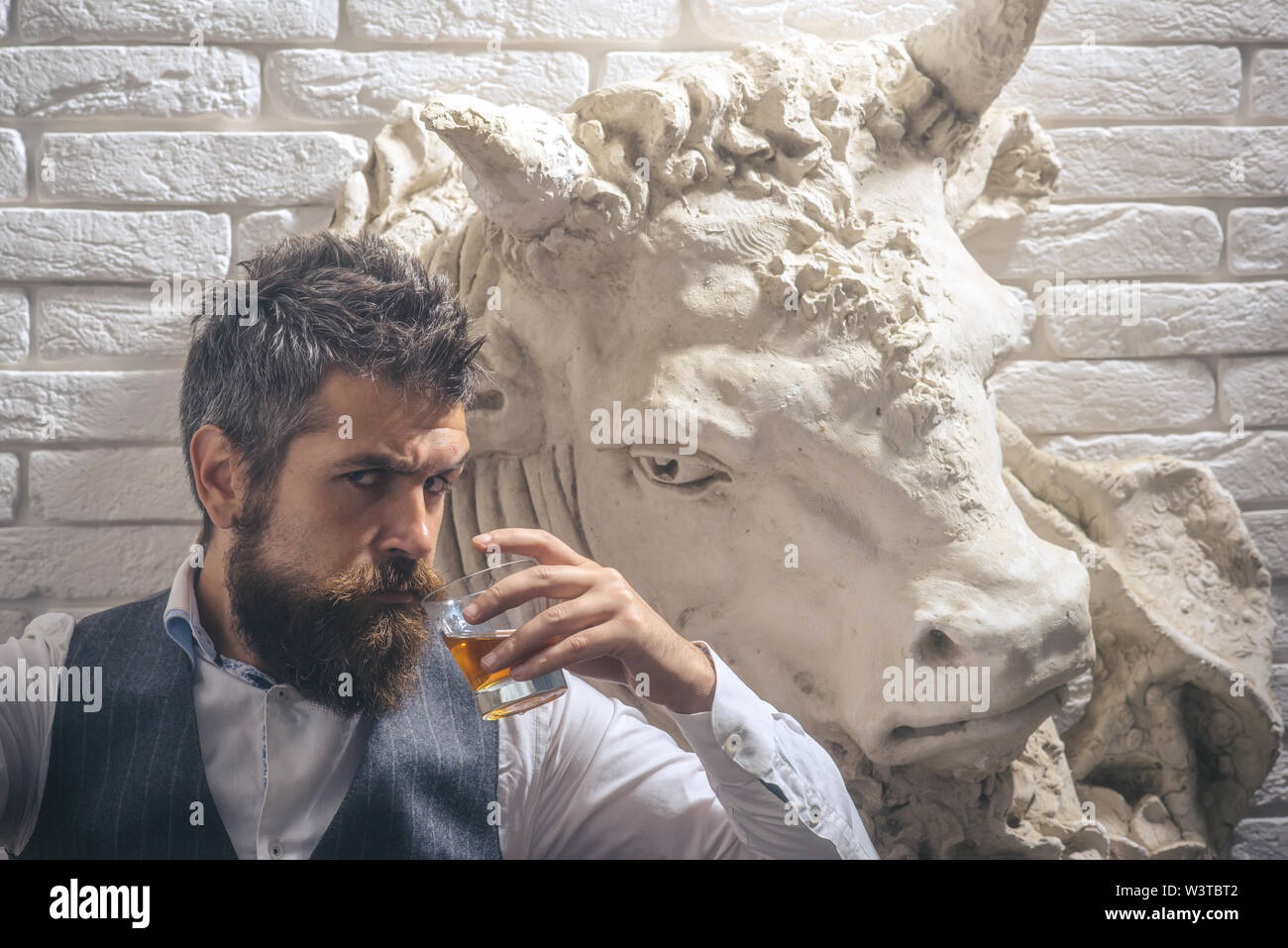 Man critic at historical statue, heritage, property Stock Photo - Alamy