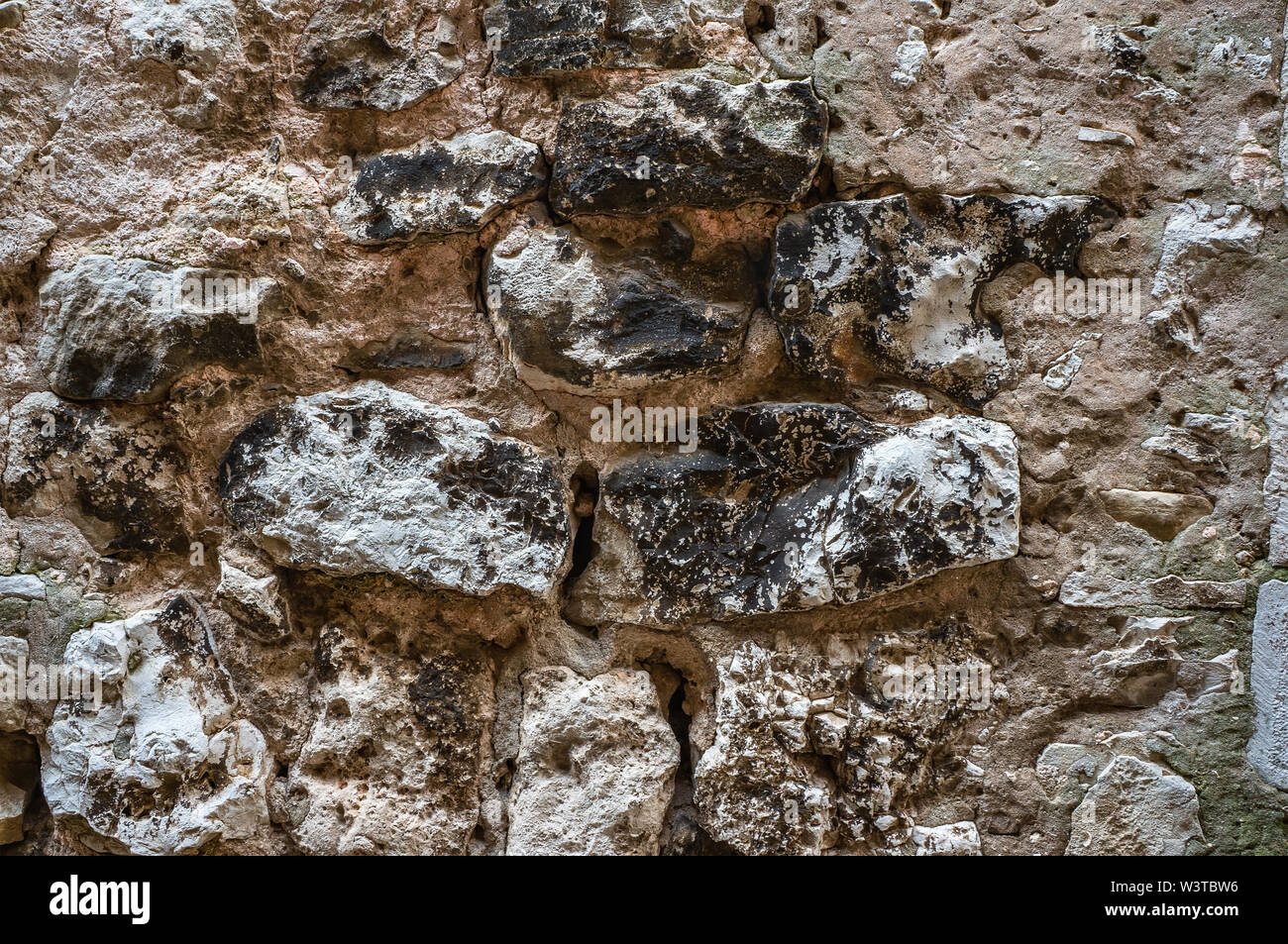 Original background of natural large stone on the wall with the texture ...