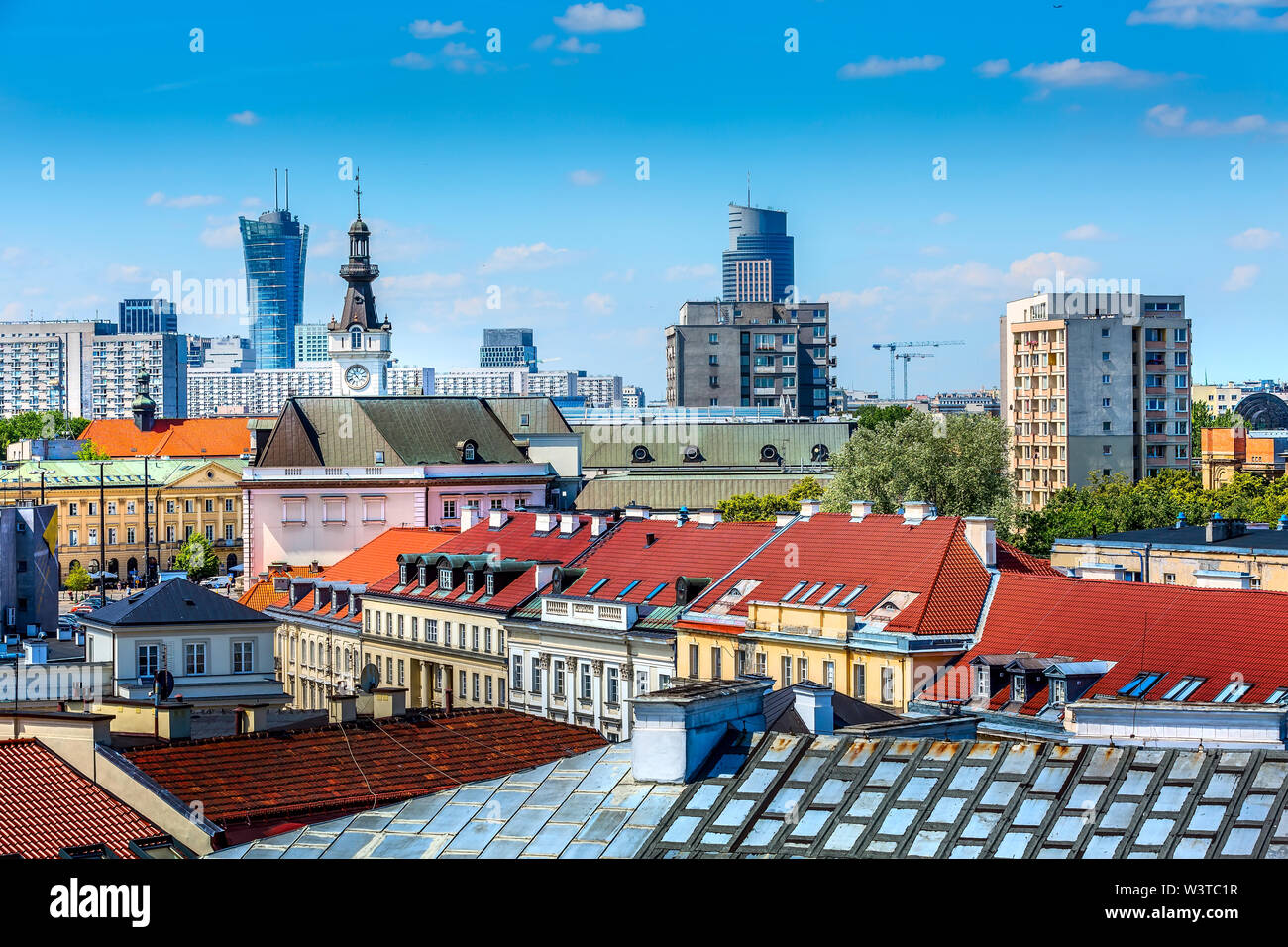 Warsaw, Poland modern skyscrapers and old colorful houses in Old Town ...