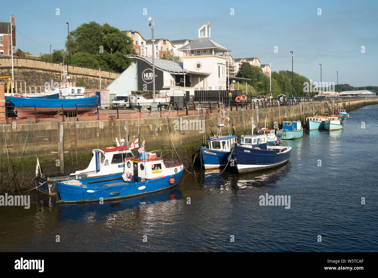 Boats moored in the river Tyne outside the Cycle Hub building in ...