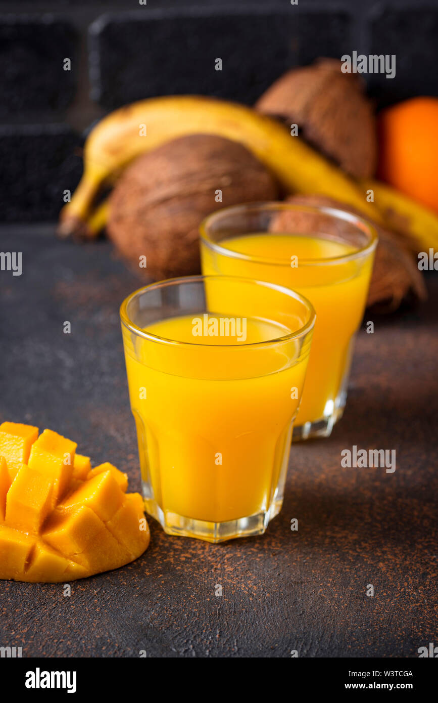 Fresh tropical mix fruit juice Stock Photo - Alamy