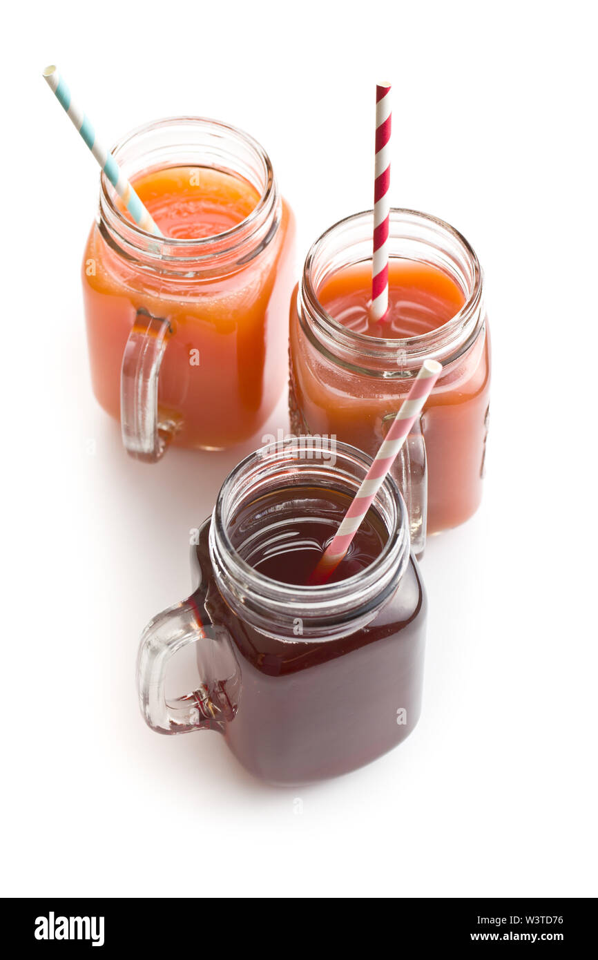 Glass of fruity juice with straw isolated on white background Stock ...