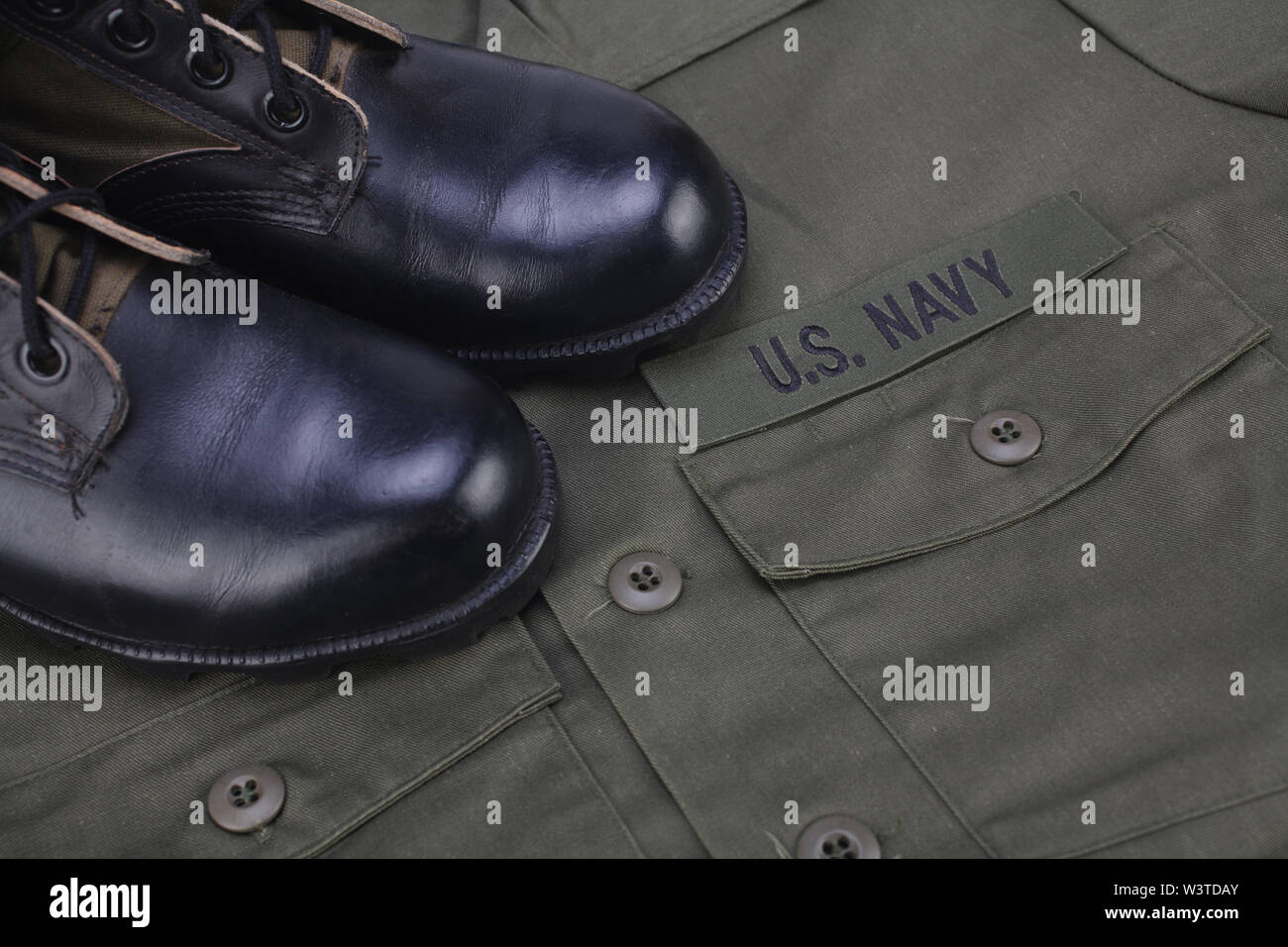 U.S. Navy olive green uniform with boots background Stock Photo - Alamy