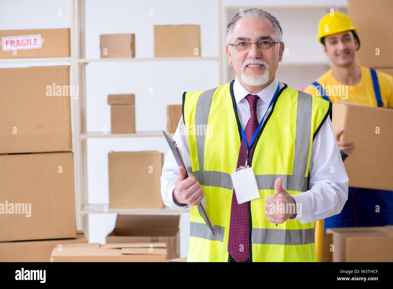 The professional movers doing home relocation Stock Photo - Alamy