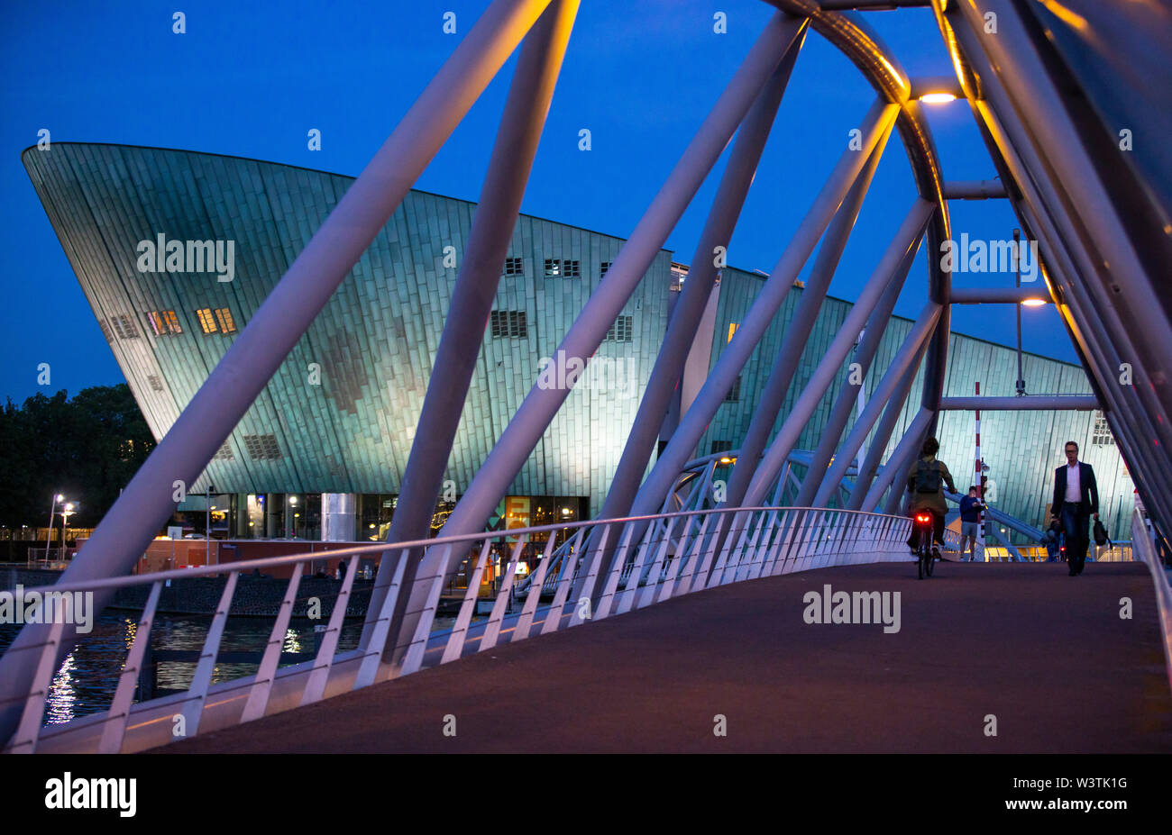 Amsterdam, Netherlands, bridge to the Nemo Science Museum, district on ...
