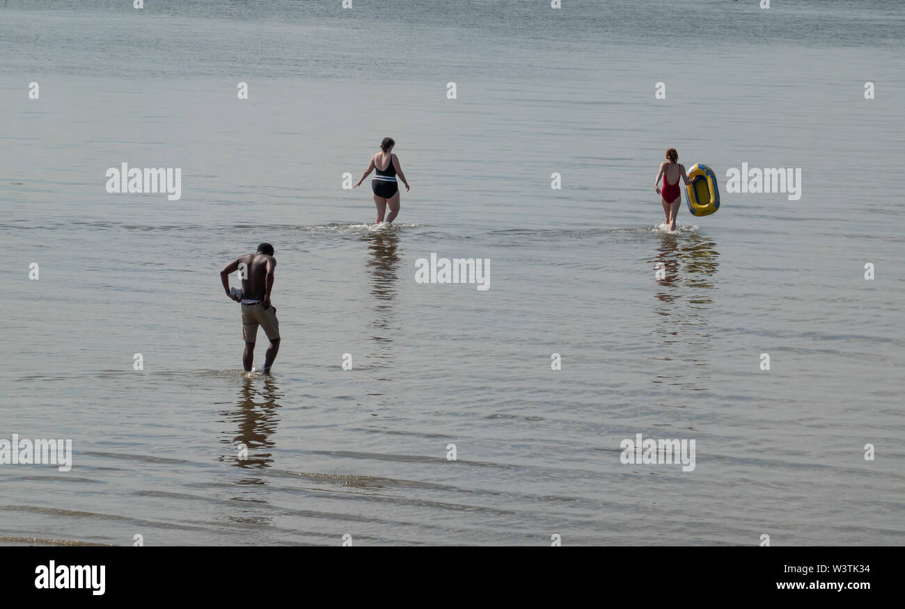 People wading hi-res stock photography and images - Alamy