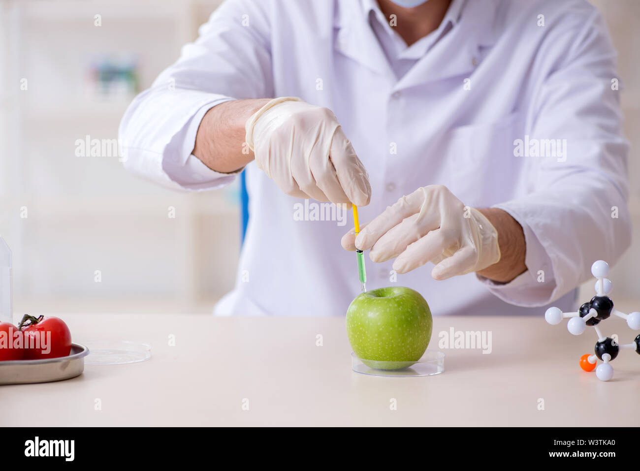 The male nutrition expert testing food products in lab Stock Photo - Alamy