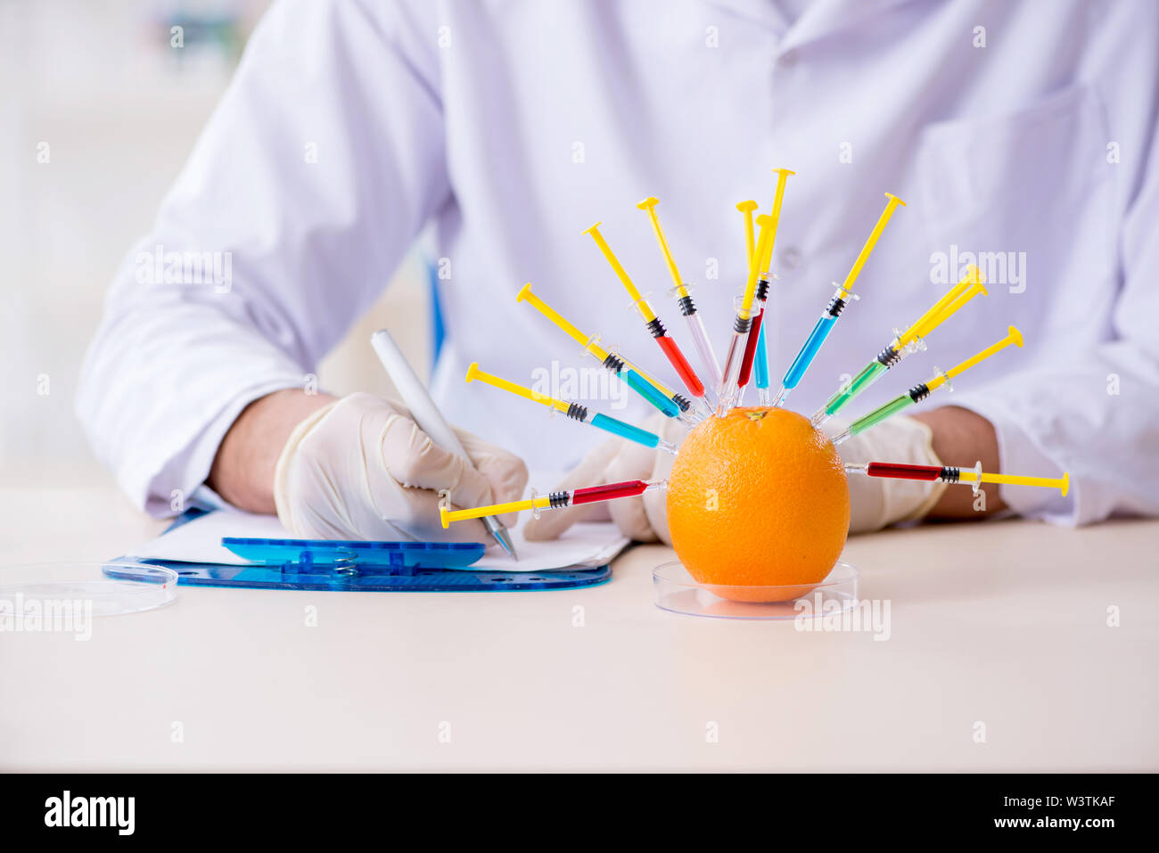 The male nutrition expert testing food products in lab Stock Photo - Alamy