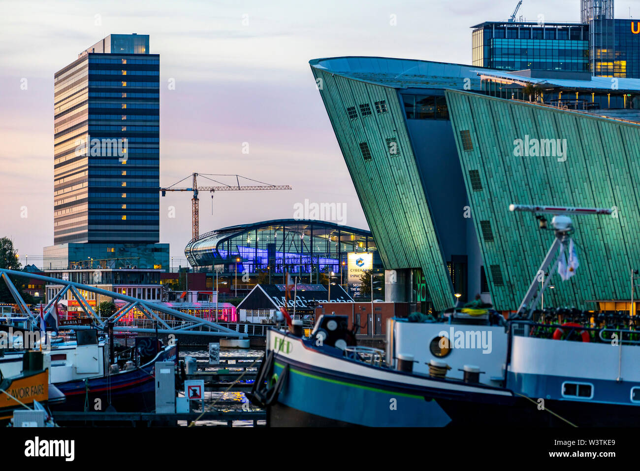 Amsterdam, Netherlands, bridges, buildings on the Dijksgracht, Nemo ...