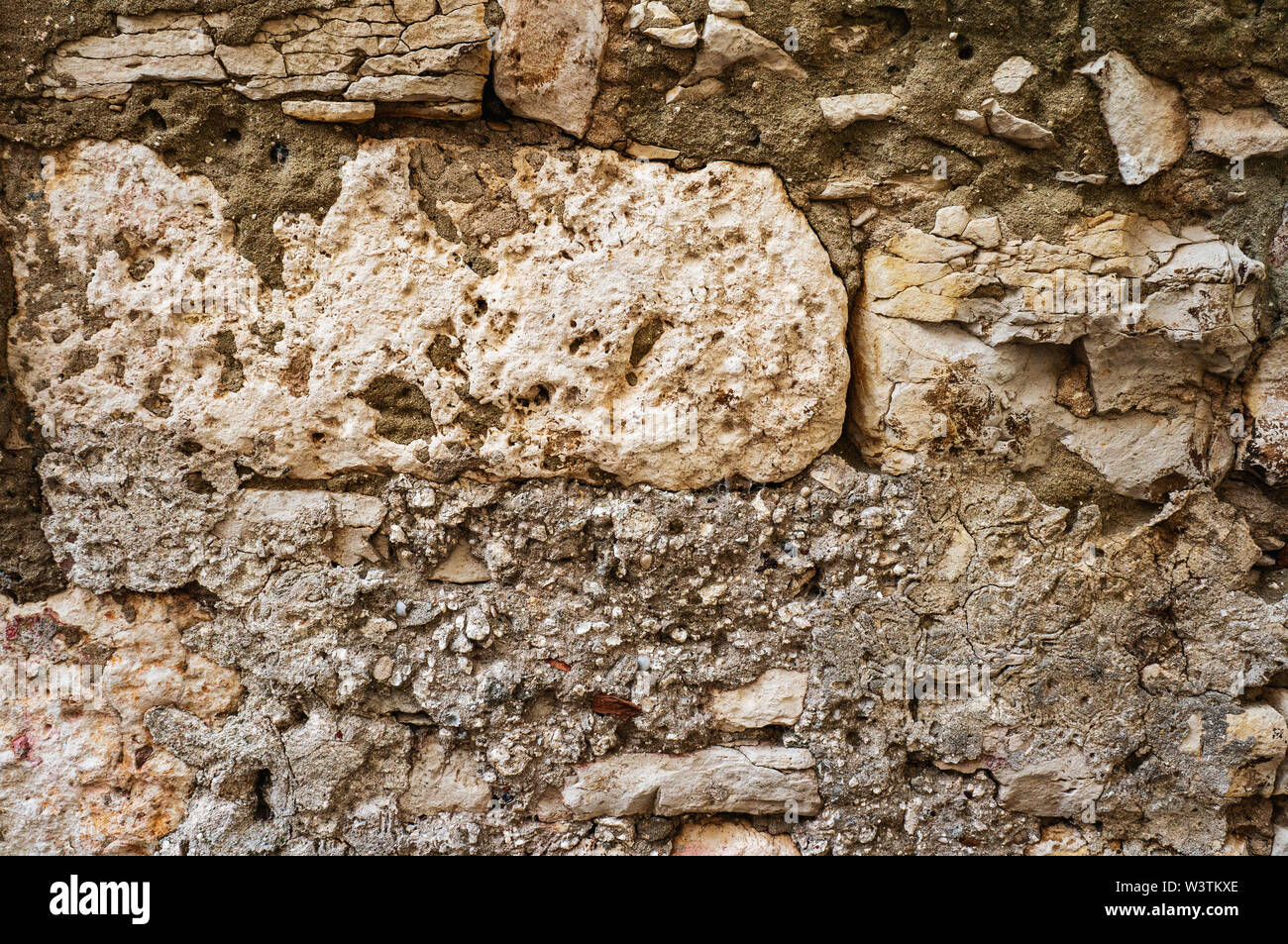 Original background of natural ancient large stone on the wall with the ...