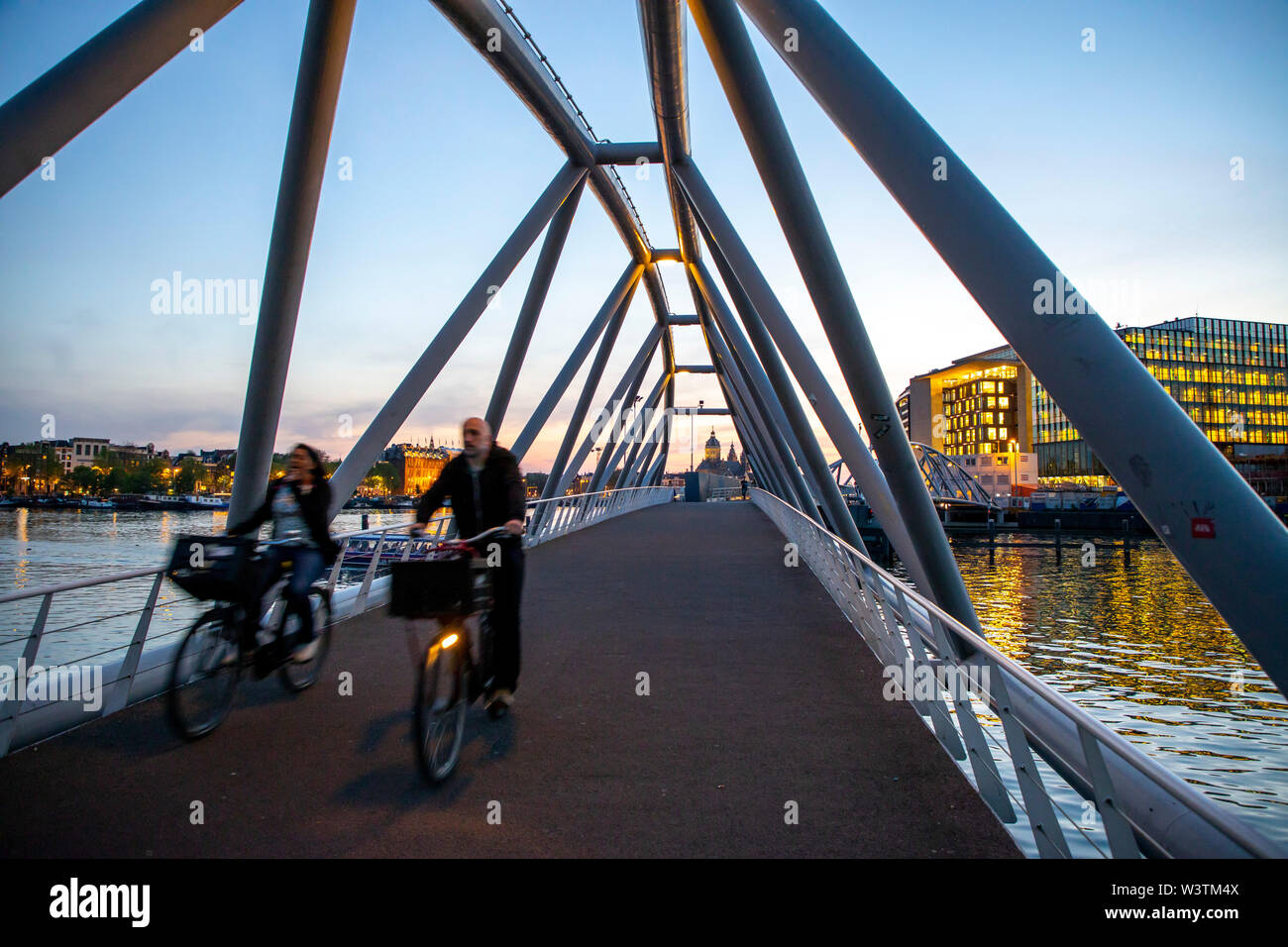 Amsterdam, Netherlands, bridge from the Nemo Science Museum to the city ...