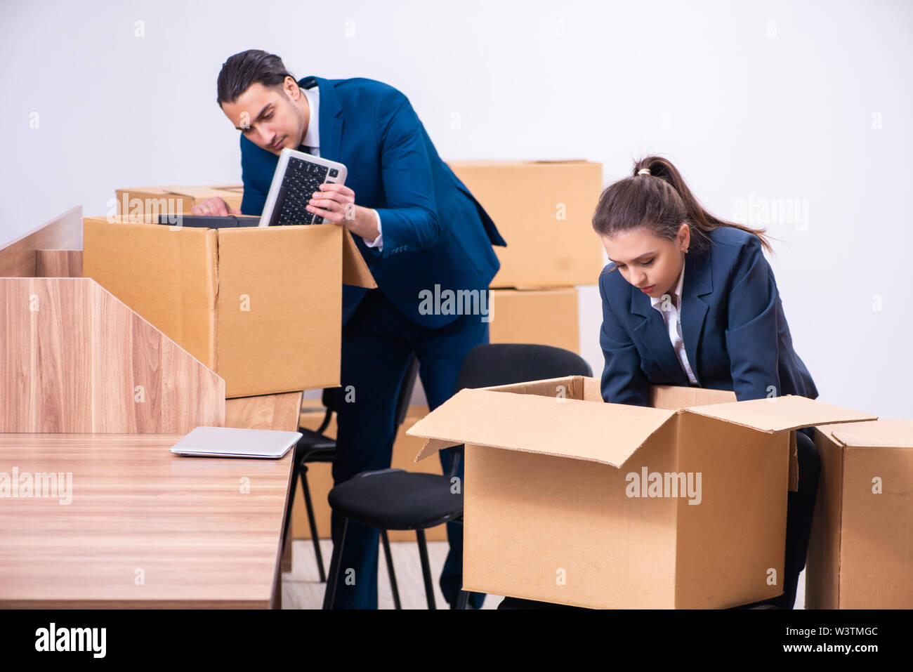 The two employees being fired from their work Stock Photo - Alamy