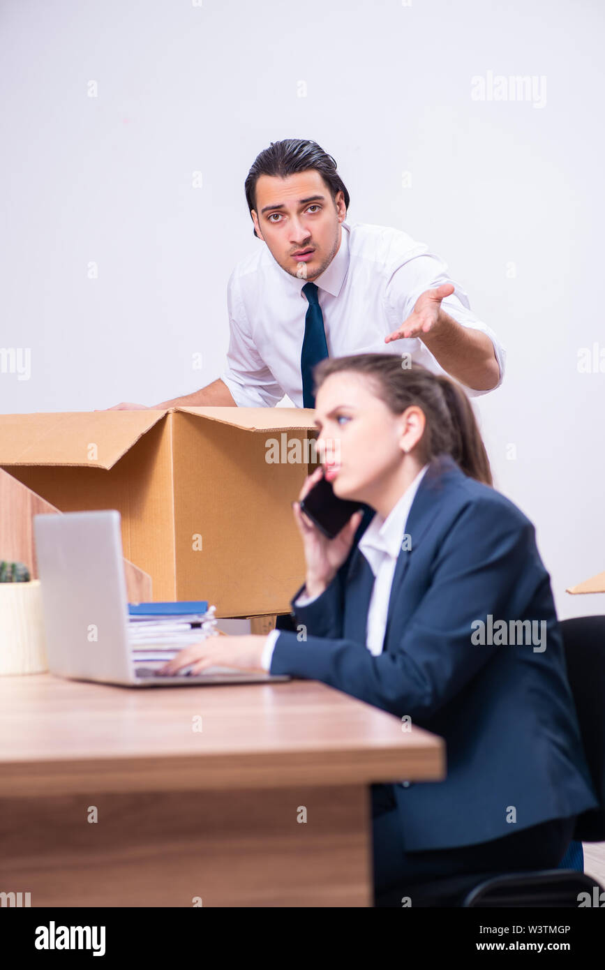 The two employees being fired from their work Stock Photo - Alamy
