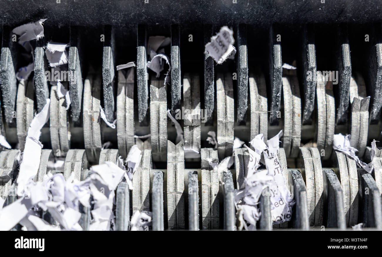 closeup view of office paper shredder teeth Stock Photo - Alamy