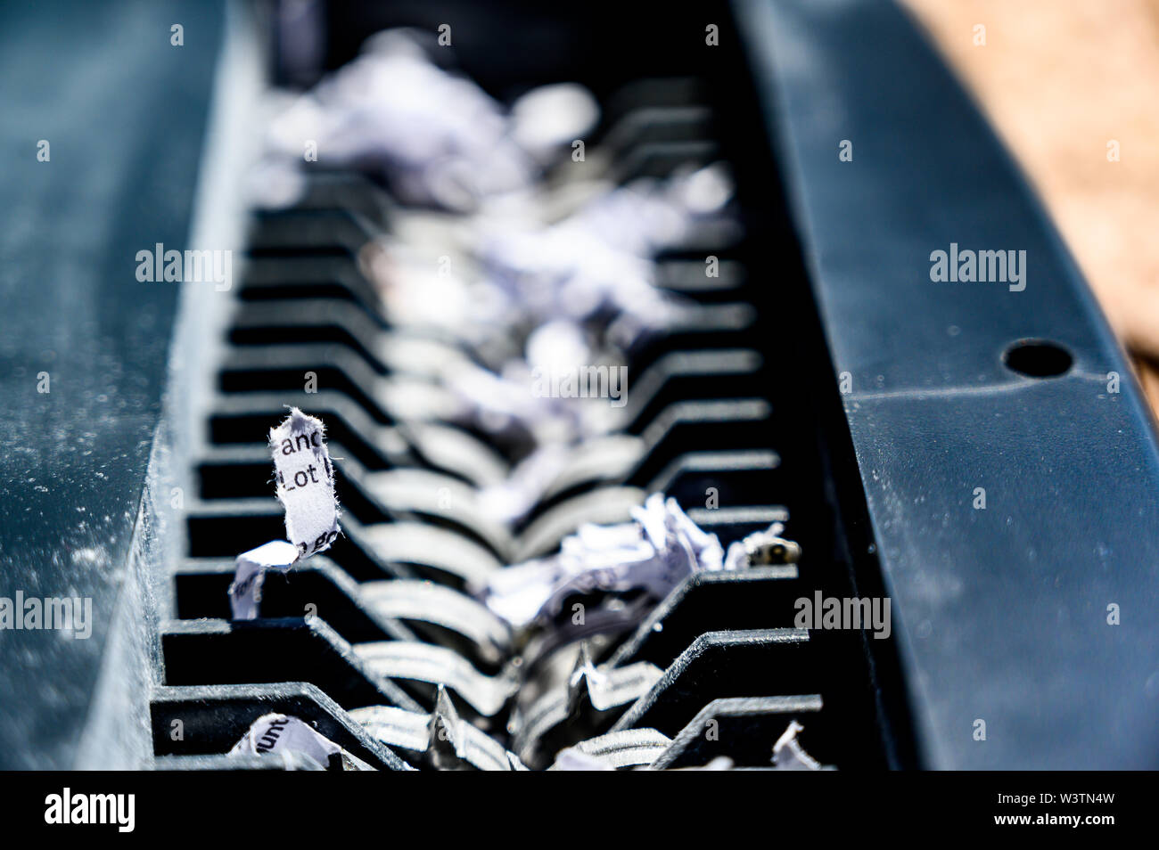closeup view of office paper shredder teeth Stock Photo - Alamy