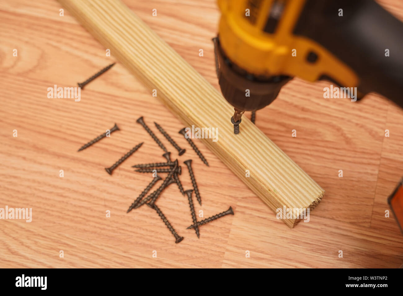 Electric screwdriver being used for a home construction project. Photo ...