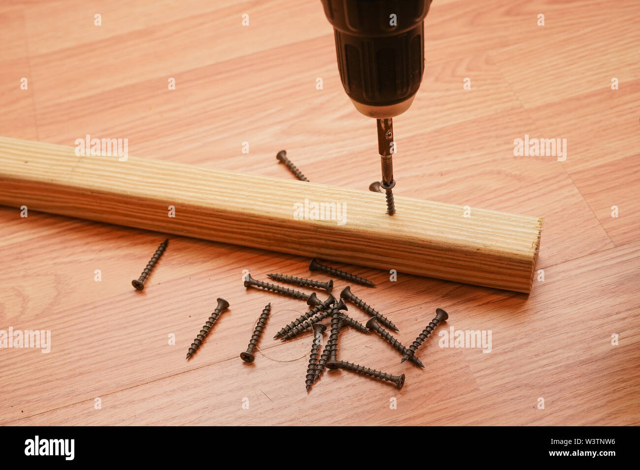 Electric screwdriver being used for a home construction project. Photo ...