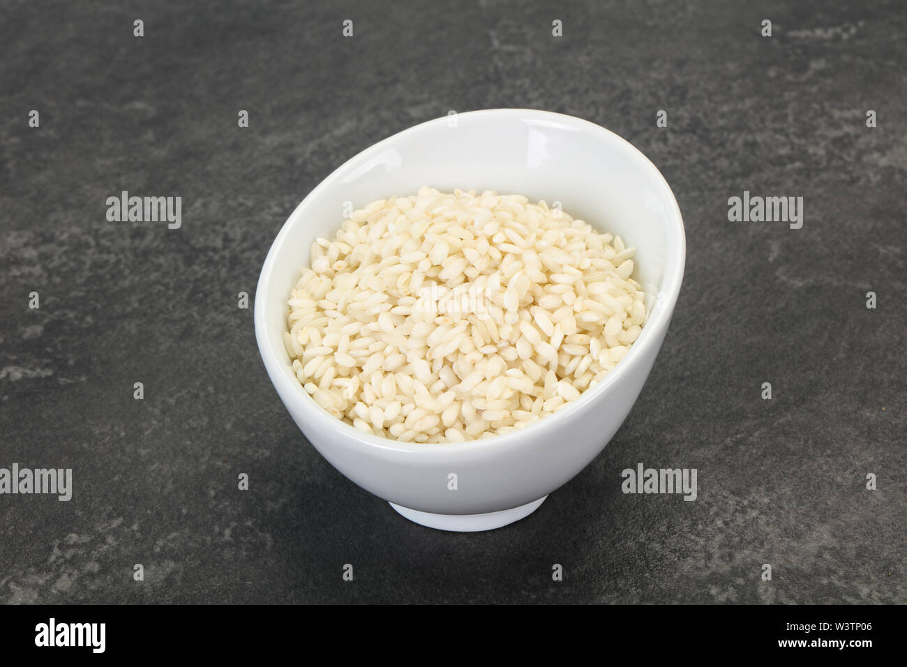 Raw Arborio rice for Italian risotto Stock Photo - Alamy