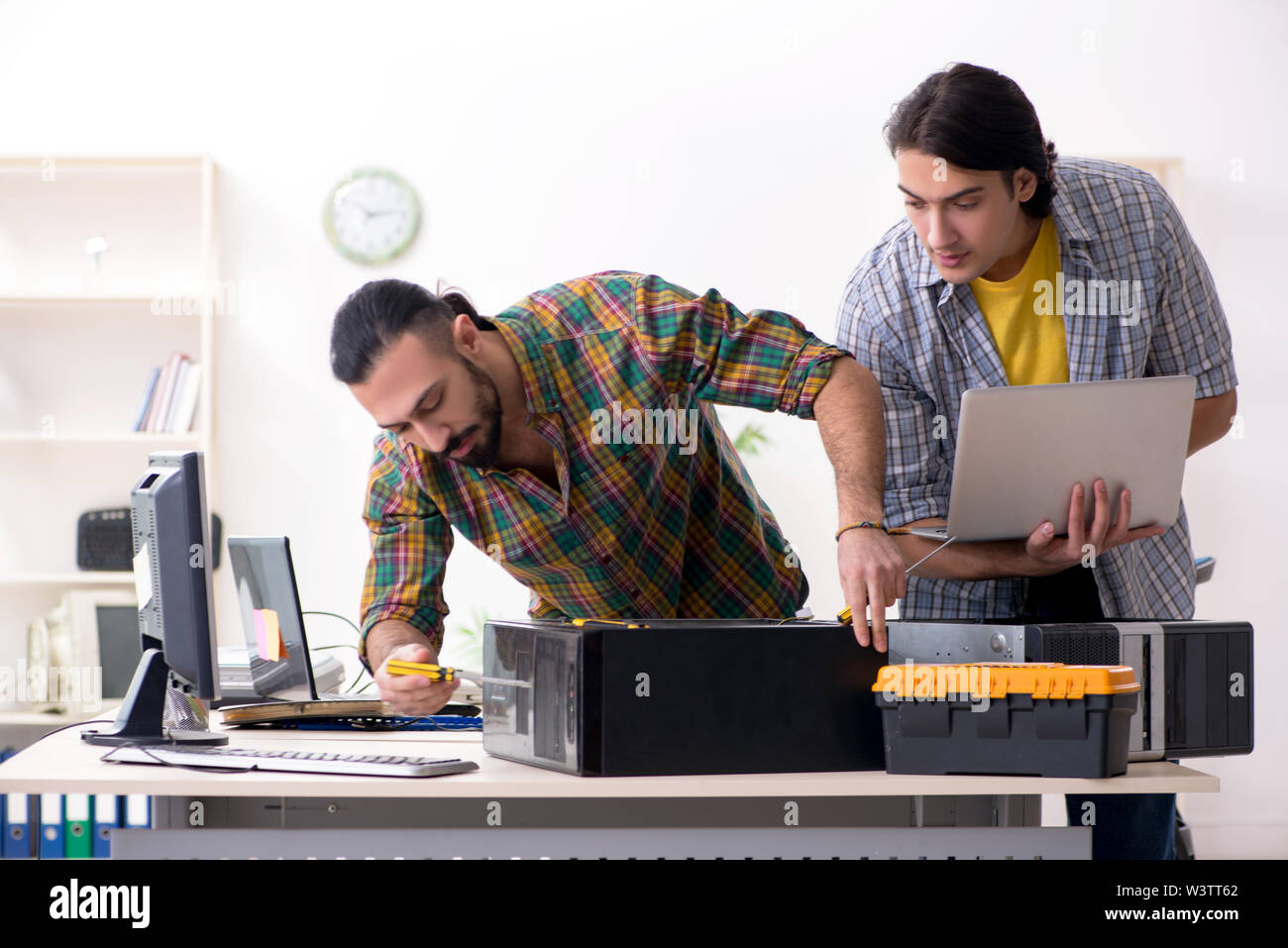 The it engineers working on hardware issue Stock Photo - Alamy