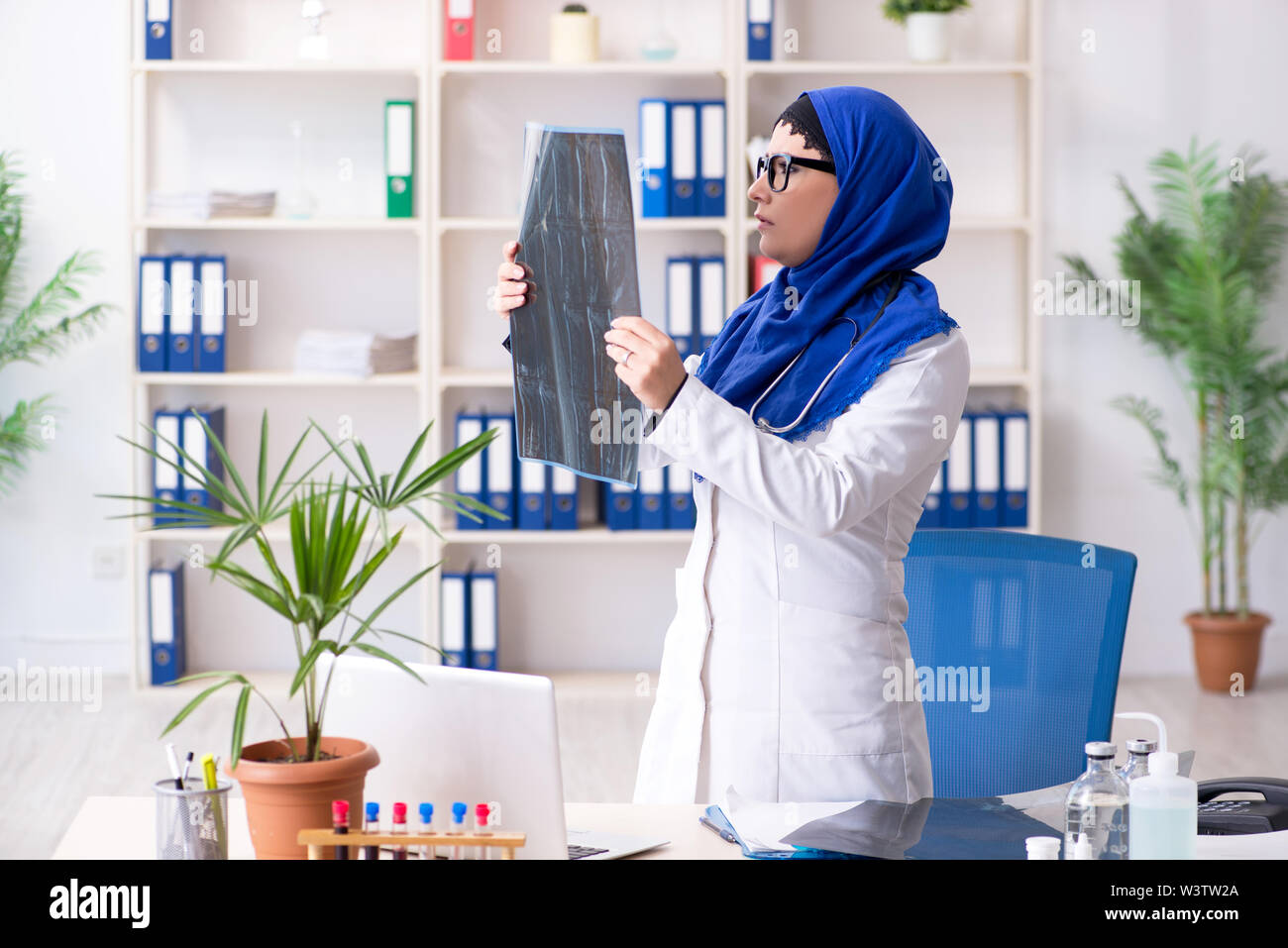 The female doctor in hijab working in the hospital Stock Photo - Alamy