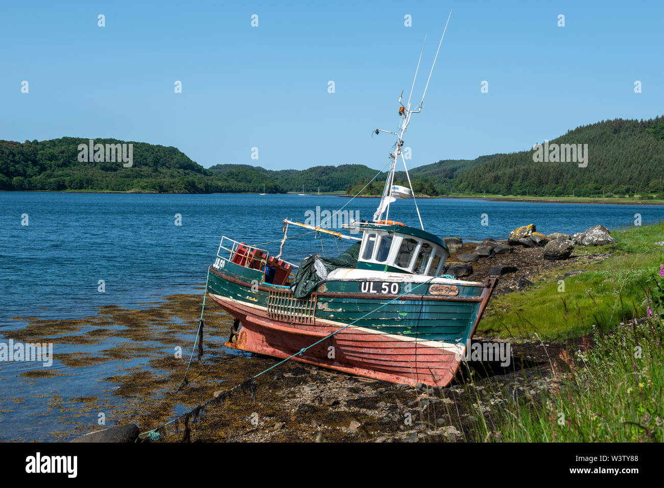 Old beached fishing boat on eastern shore of Loch Sween in Knapdale ...