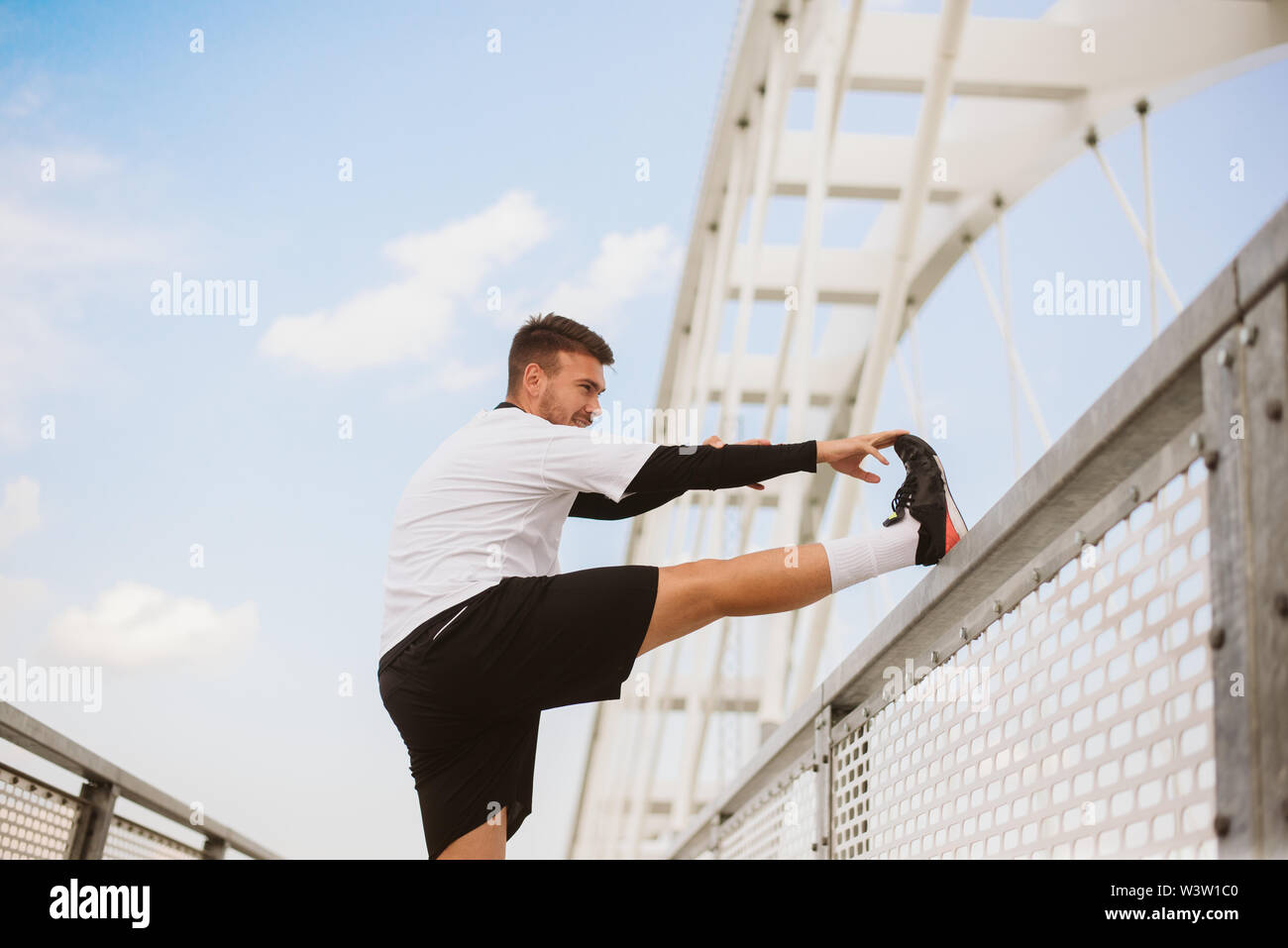 Athletic Man Doing Running Exercise Stock Photo - Alamy