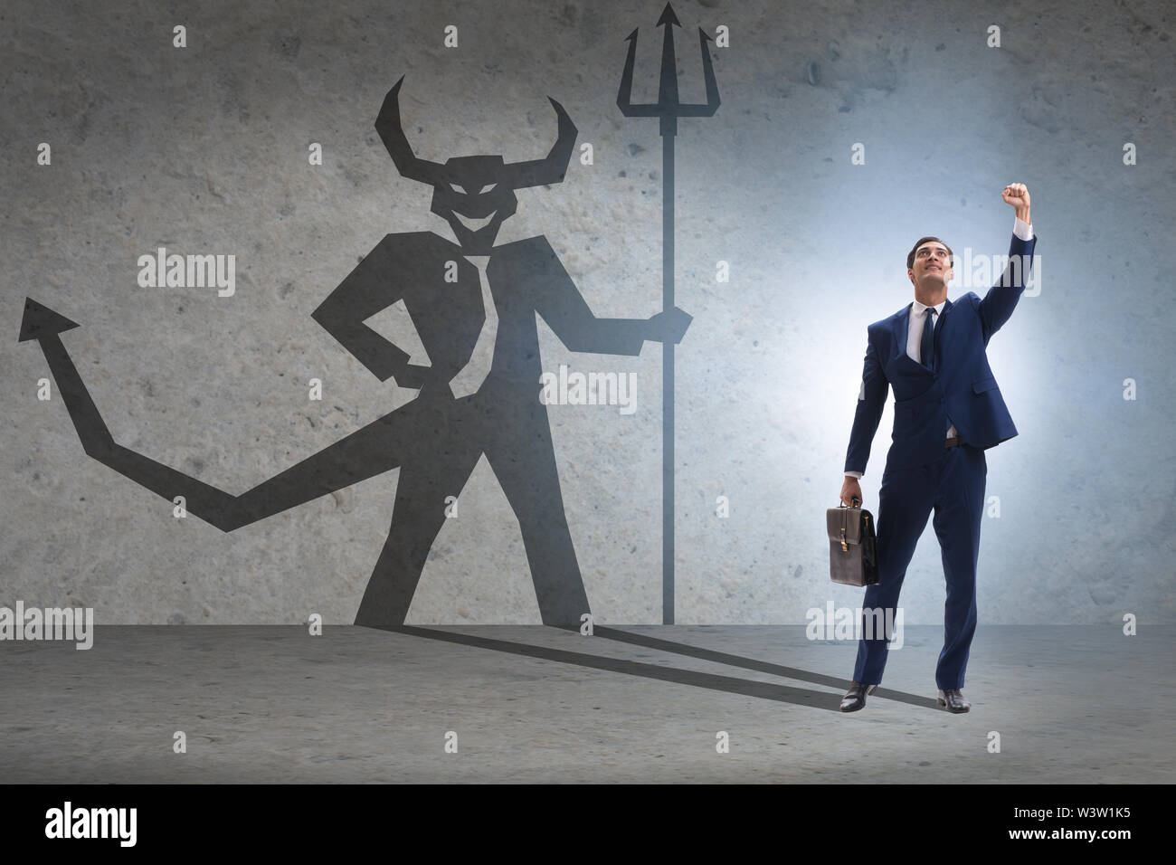 The devil hiding in the businessman - alter ego concept Stock Photo - Alamy
