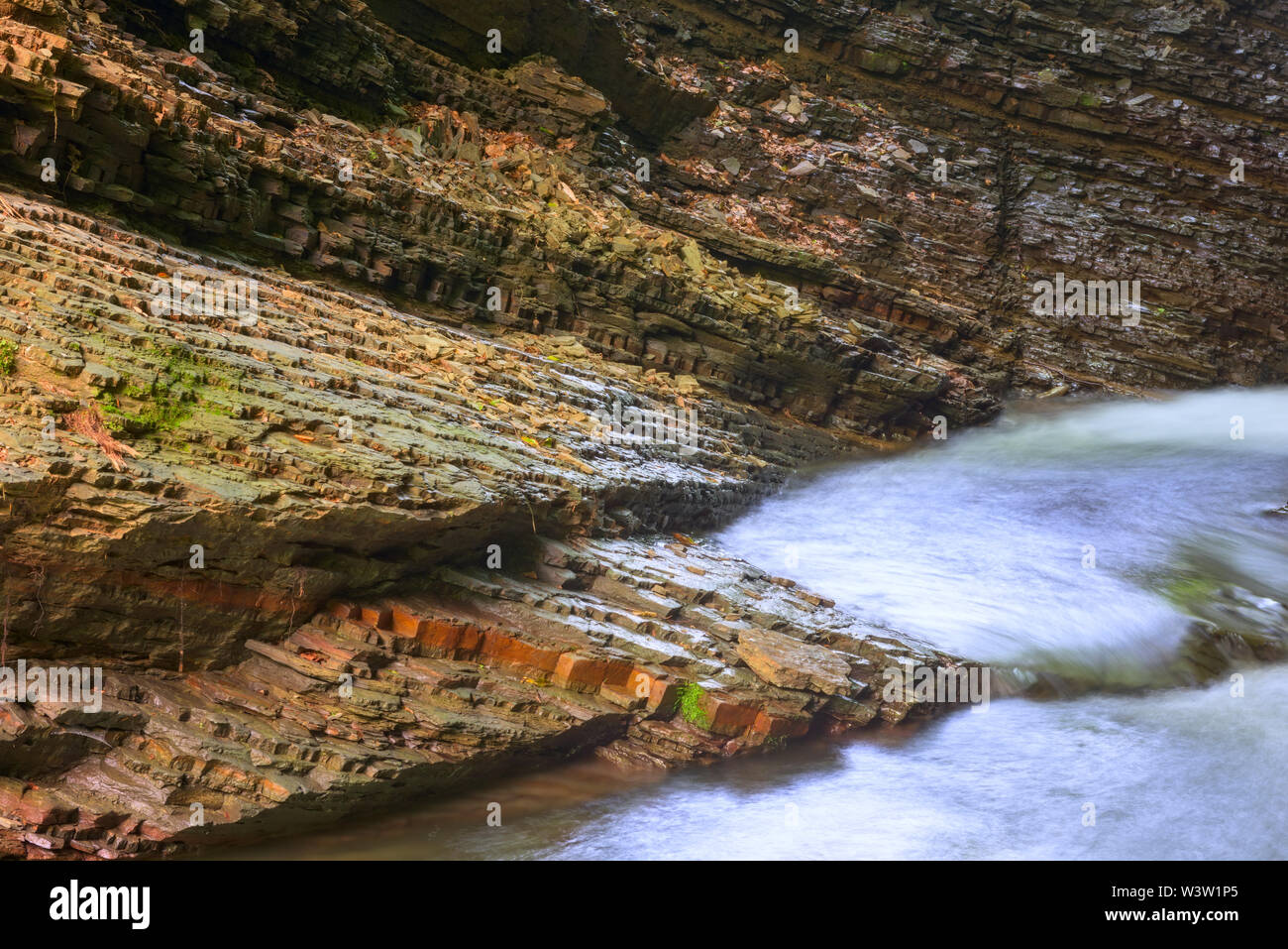 Rock structure destroyed by water of mountain waterfall, nature ...