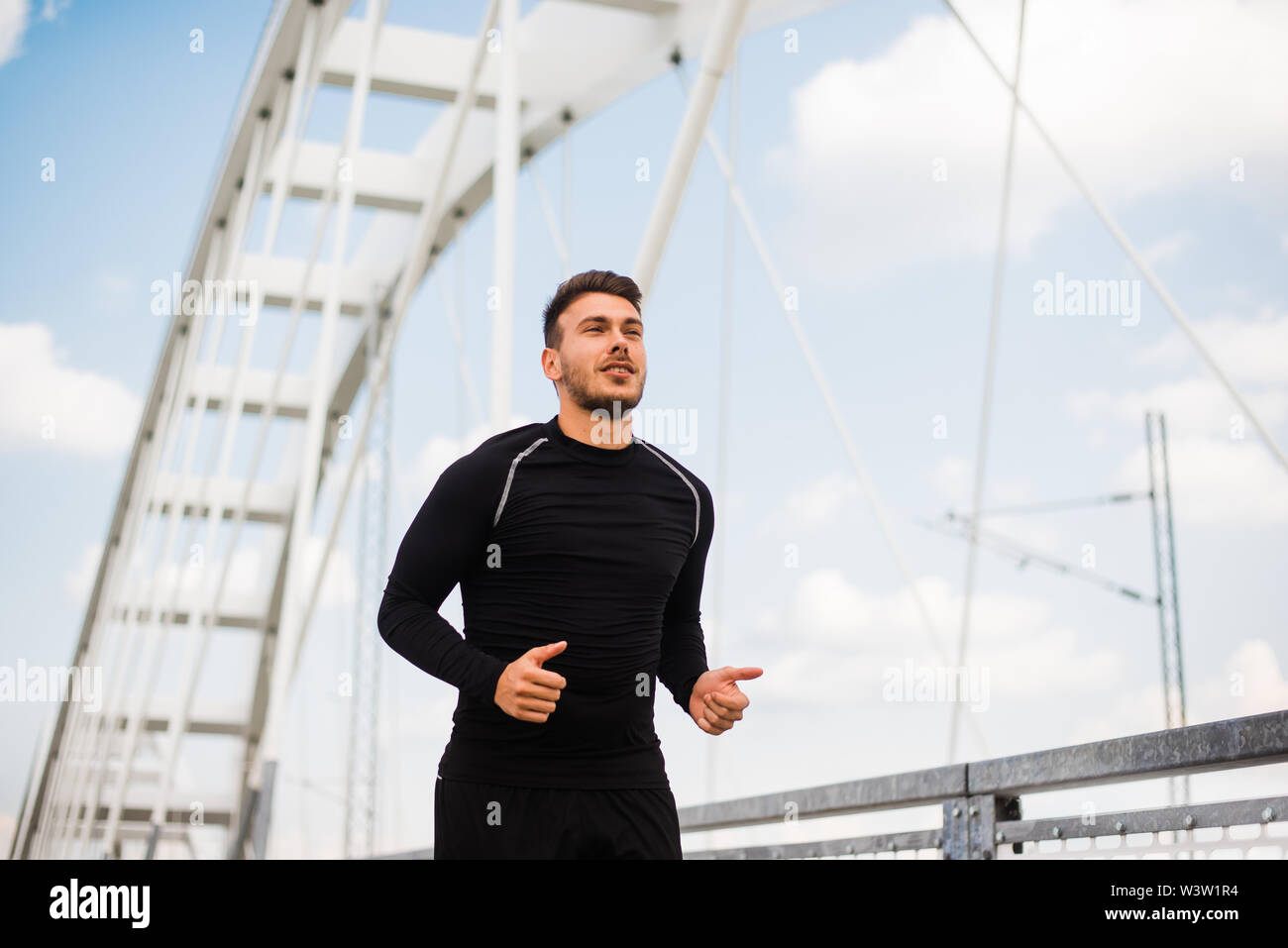 Athletic Man Doing Running Exercise Stock Photo - Alamy