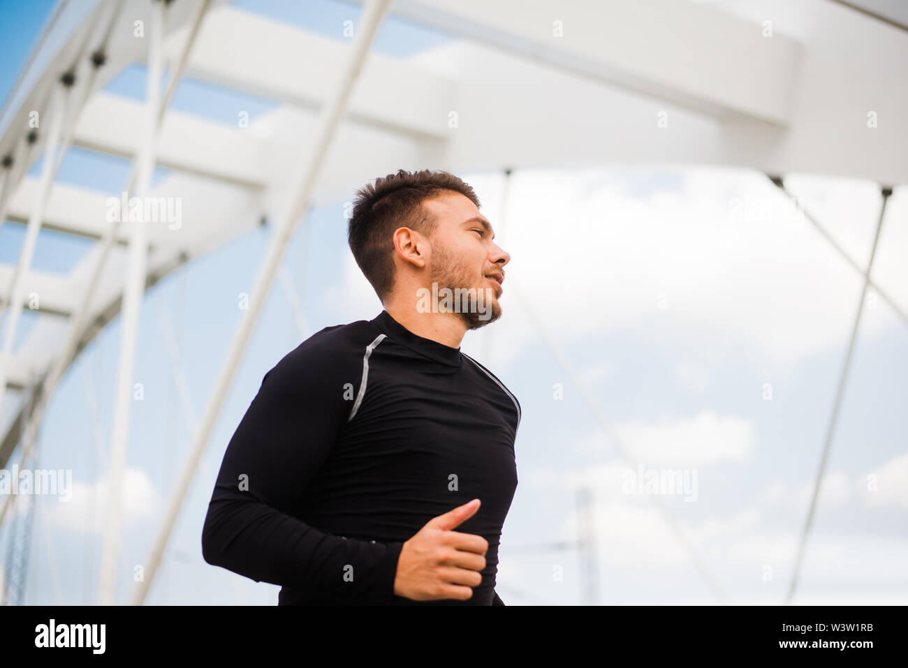 Athletic Man Doing Running Exercise Stock Photo - Alamy