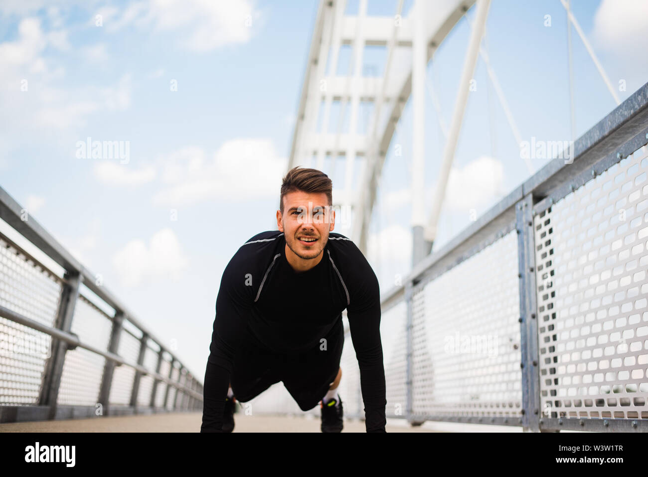 Athletic Man Doing Running Exercise Stock Photo - Alamy