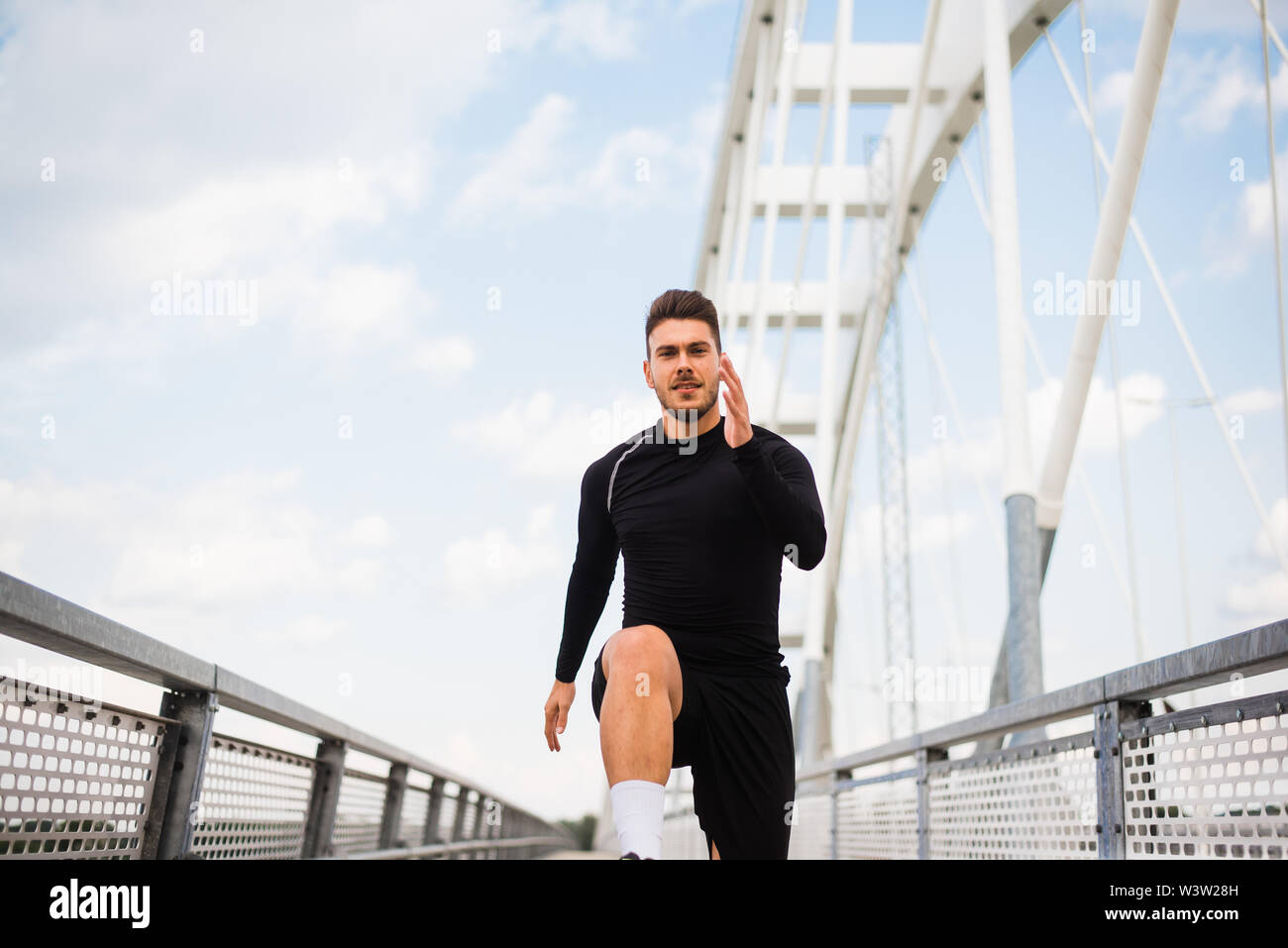 Athletic Man Doing Running Exercise Stock Photo - Alamy
