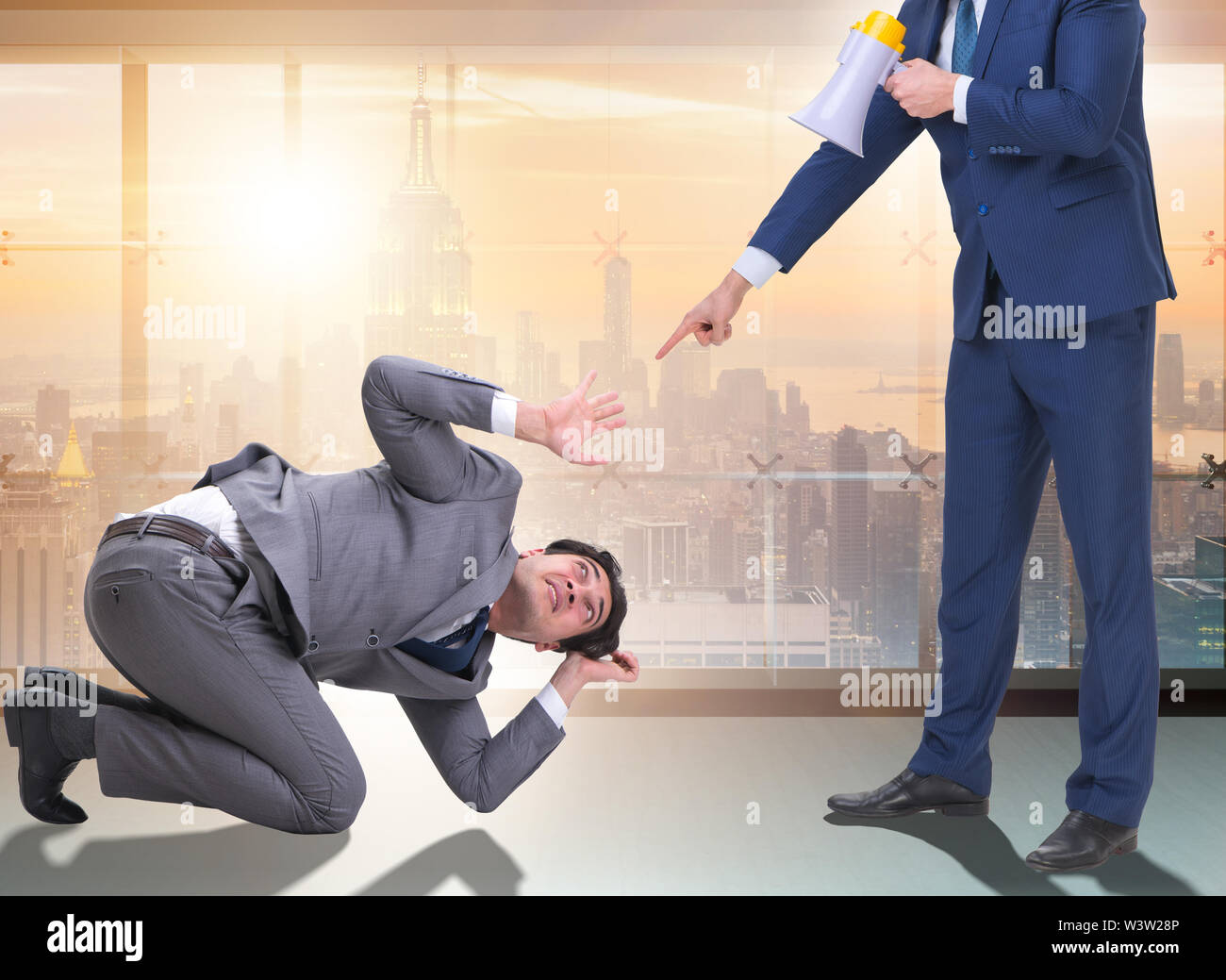 The bad angry boss shouting at employee with loudspeaker Stock Photo ...