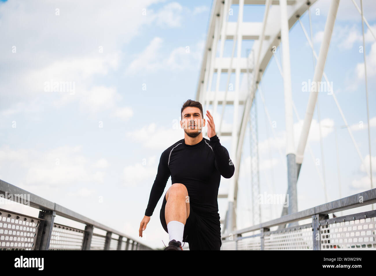 Athletic Man Doing Running Exercise Stock Photo - Alamy