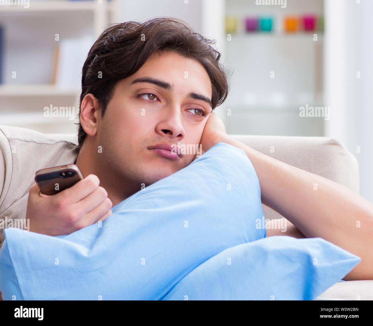 The man addicted to his mobile phone in bed Stock Photo - Alamy