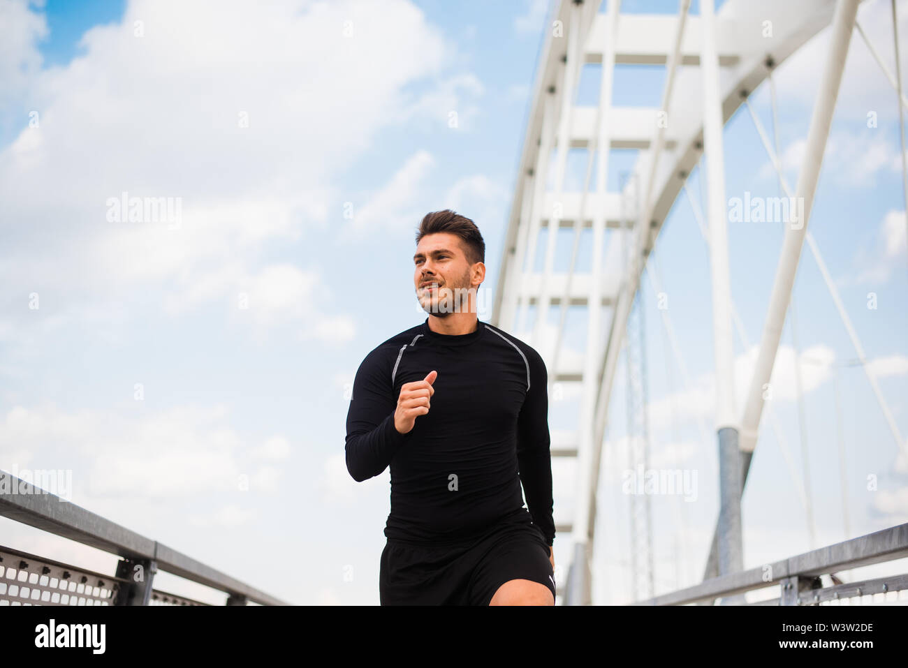 Athletic Man Doing Running Exercise Stock Photo - Alamy