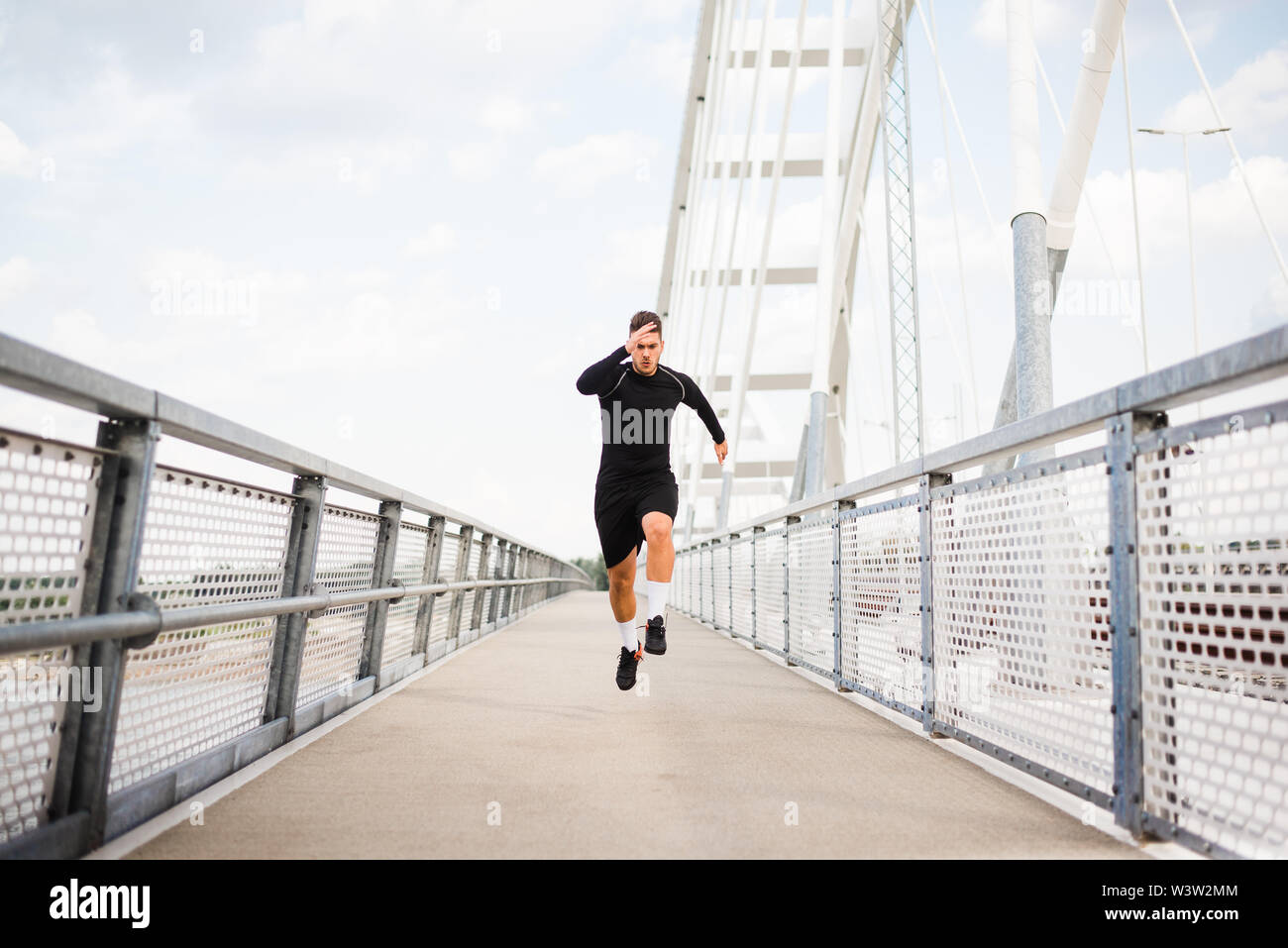 Athletic Man Doing Running Exercise Stock Photo - Alamy