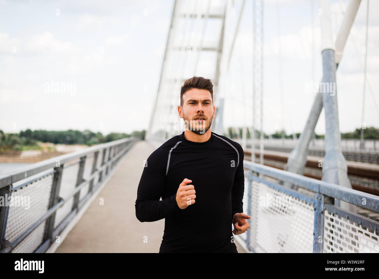 Athletic Man Doing Running Exercise Stock Photo - Alamy