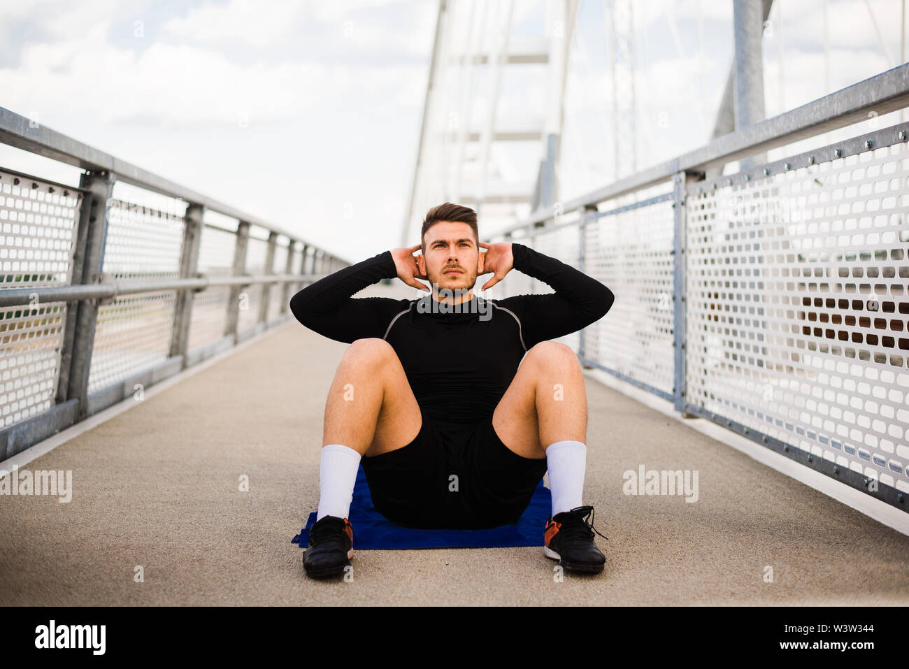 Athletic Man Doing Running Exercise Stock Photo - Alamy