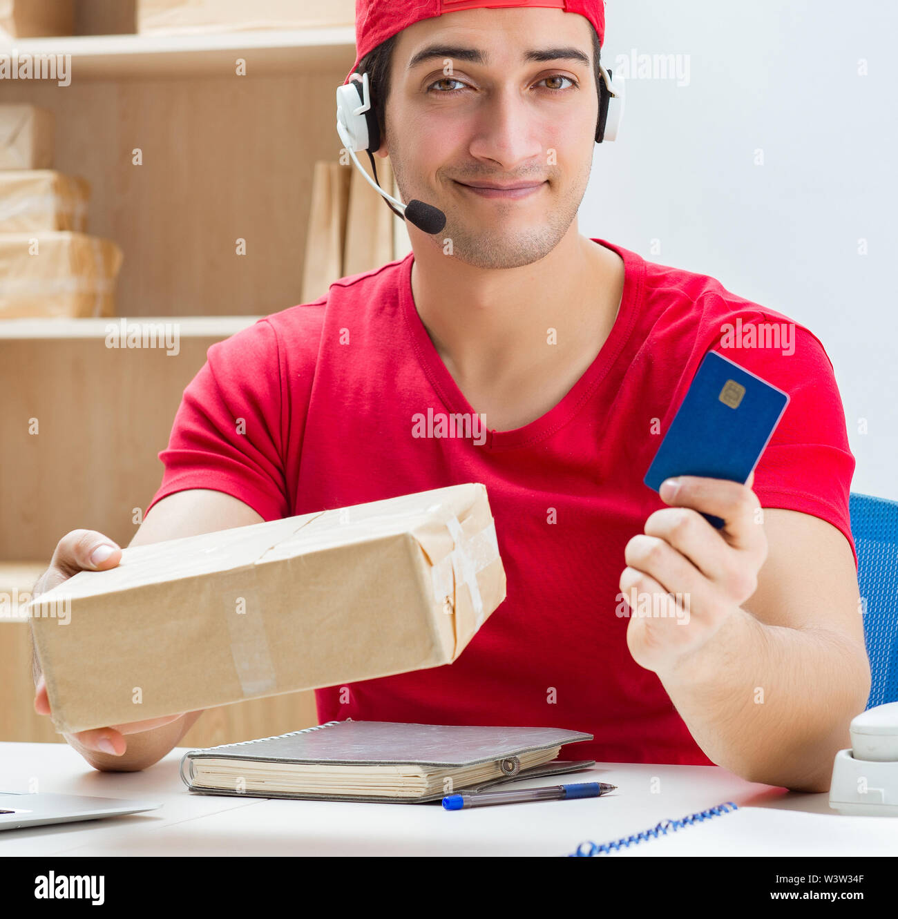 The call center worker at parcel distribution center in post office ...