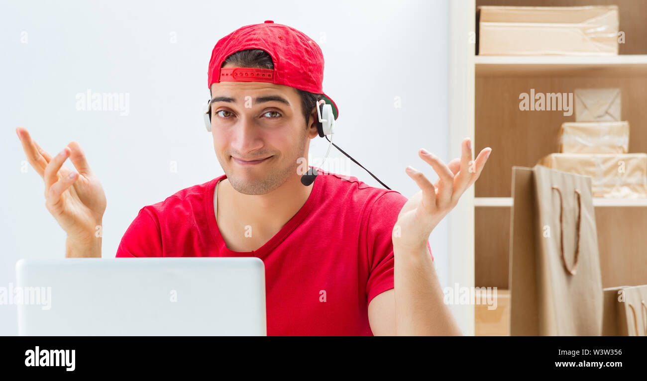 The call center worker at parcel distribution center in post office ...