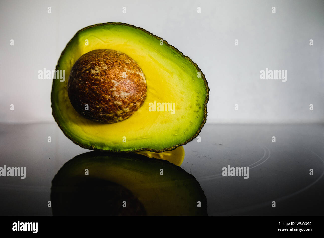 Bird Eating Avocado High Resolution Stock Photography and Images - Alamy