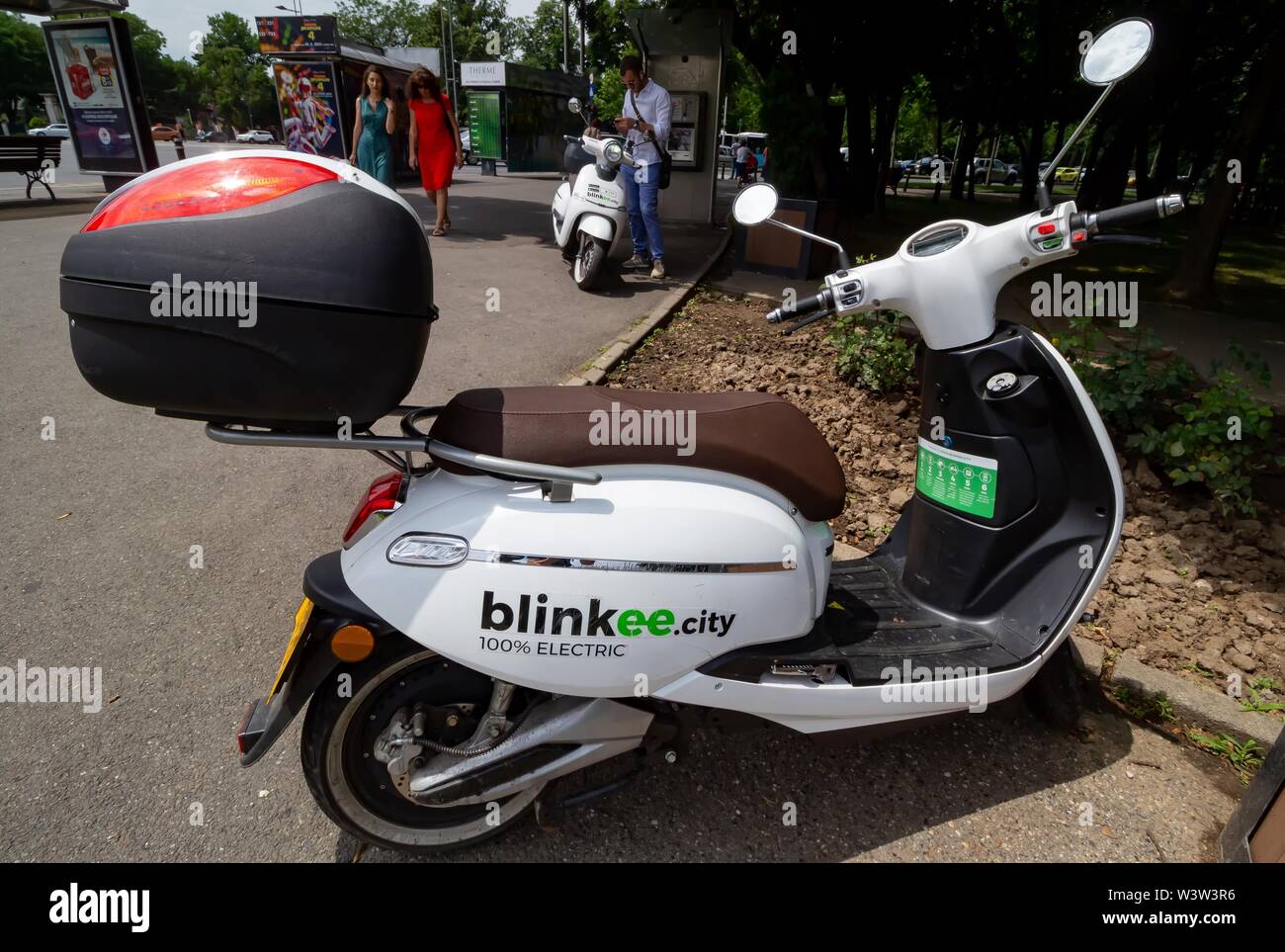 Bucharest, Romania - July 01, 2019: Two blinkee.city mopeds, which can ...