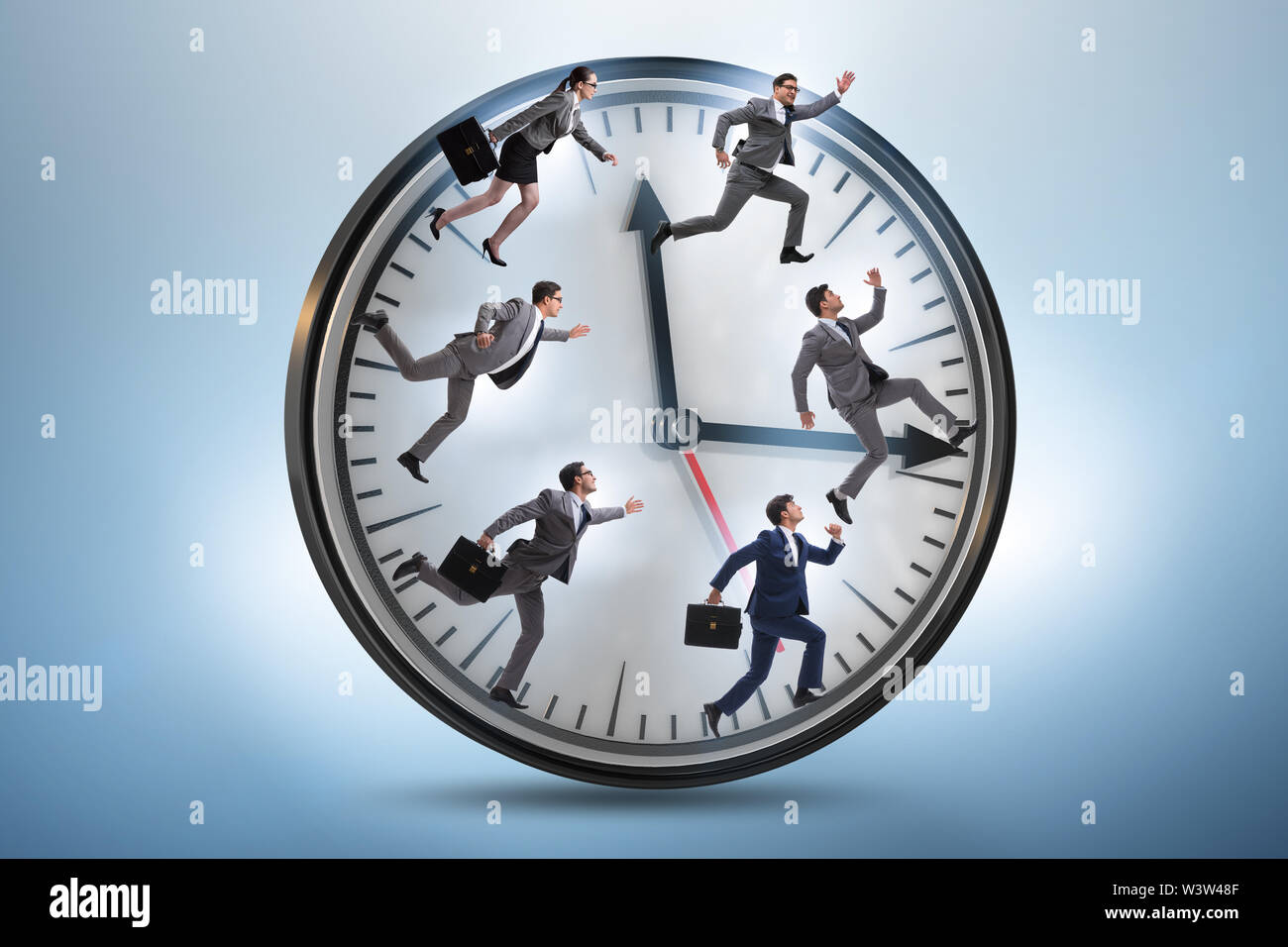 The man and woman running on clock Stock Photo - Alamy