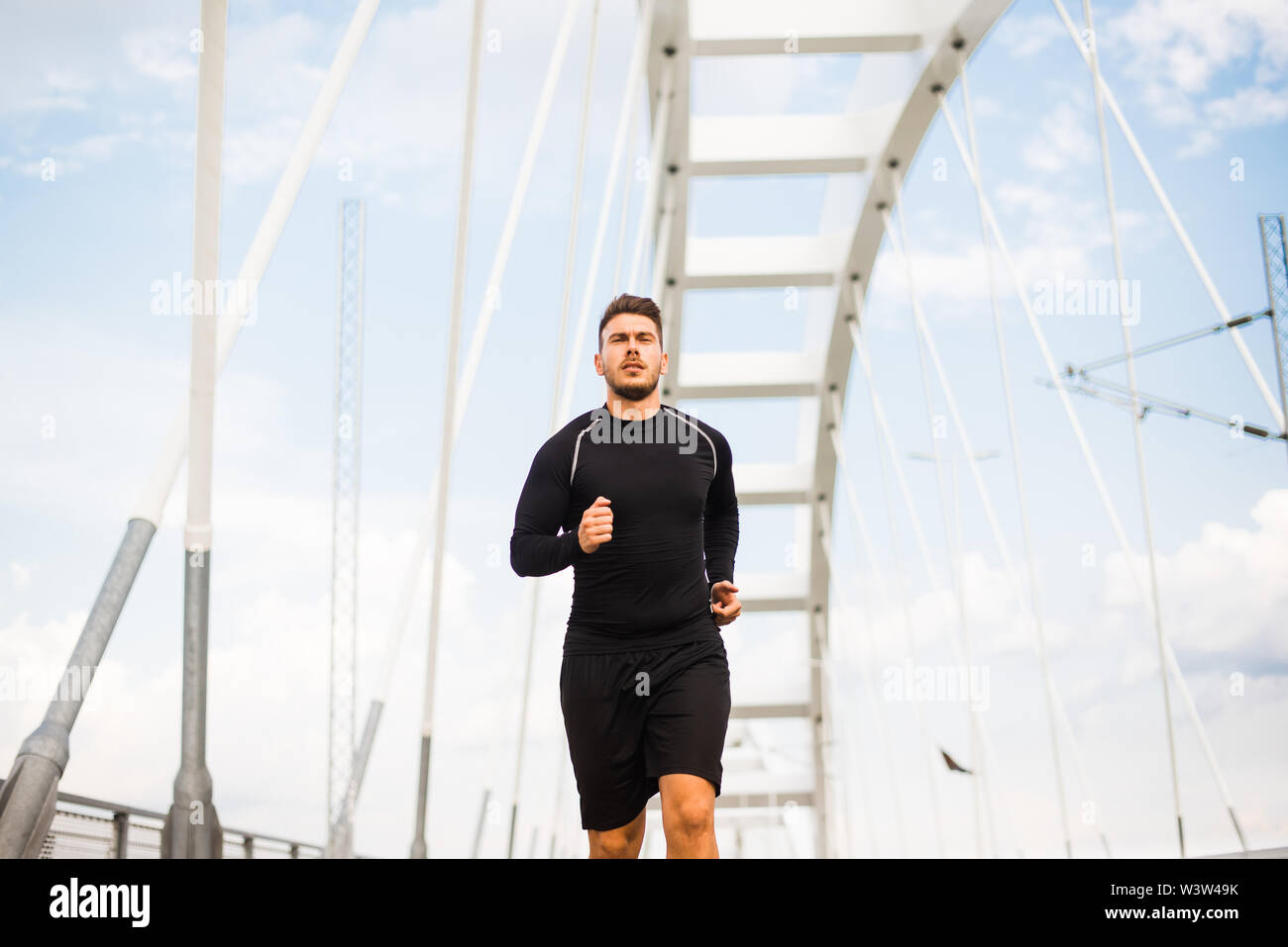 Athletic Man Doing Running Exercise Stock Photo - Alamy