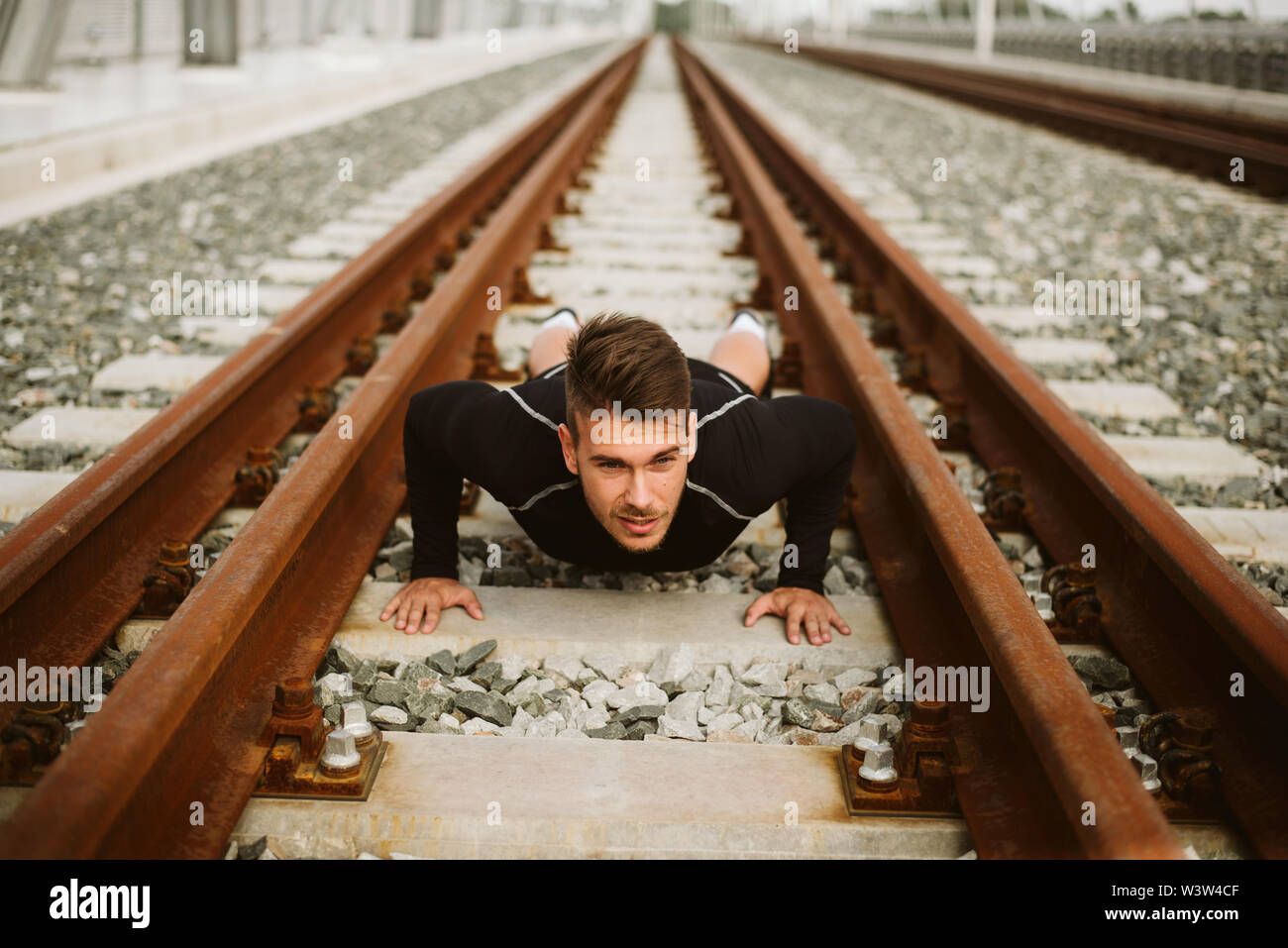Athletic Man Doing Running Exercise Stock Photo - Alamy