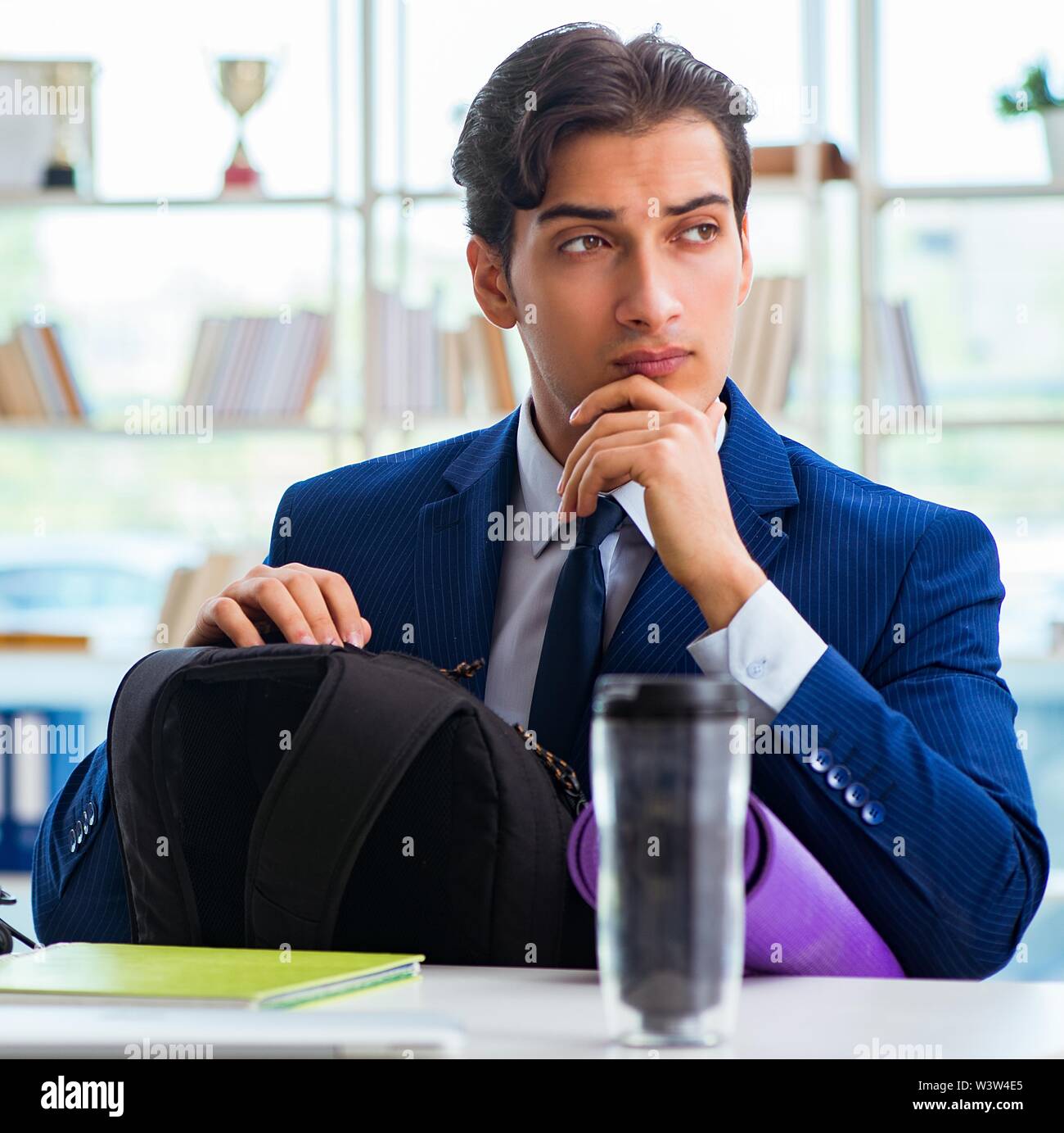 The man getting ready for sports break in the office Stock Photo - Alamy