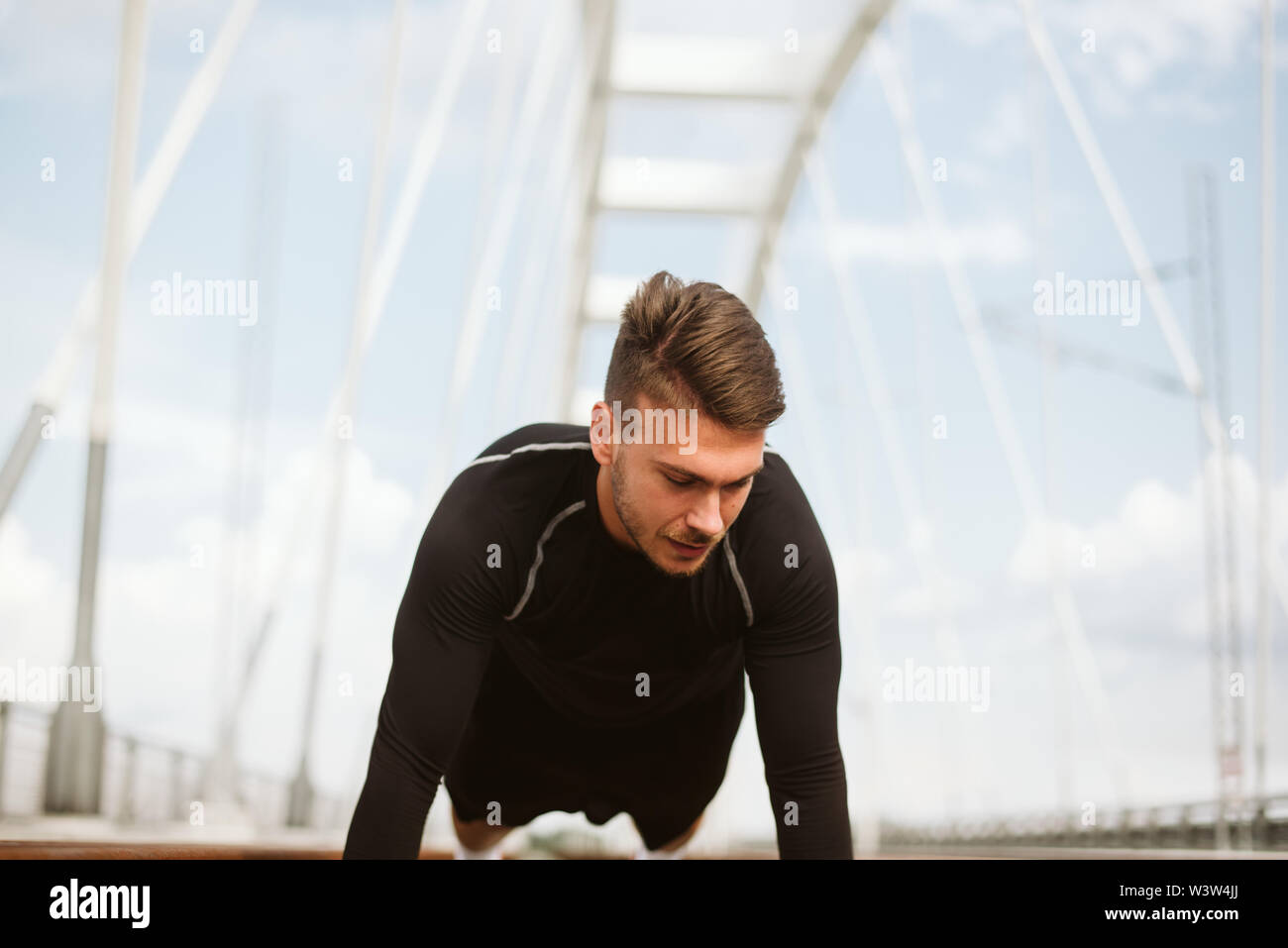 Athletic Man Doing Running Exercise Stock Photo - Alamy