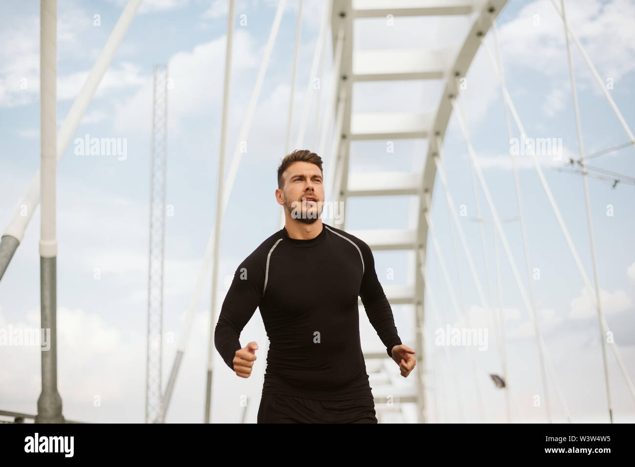 Athletic Man Doing Running Exercise Stock Photo - Alamy